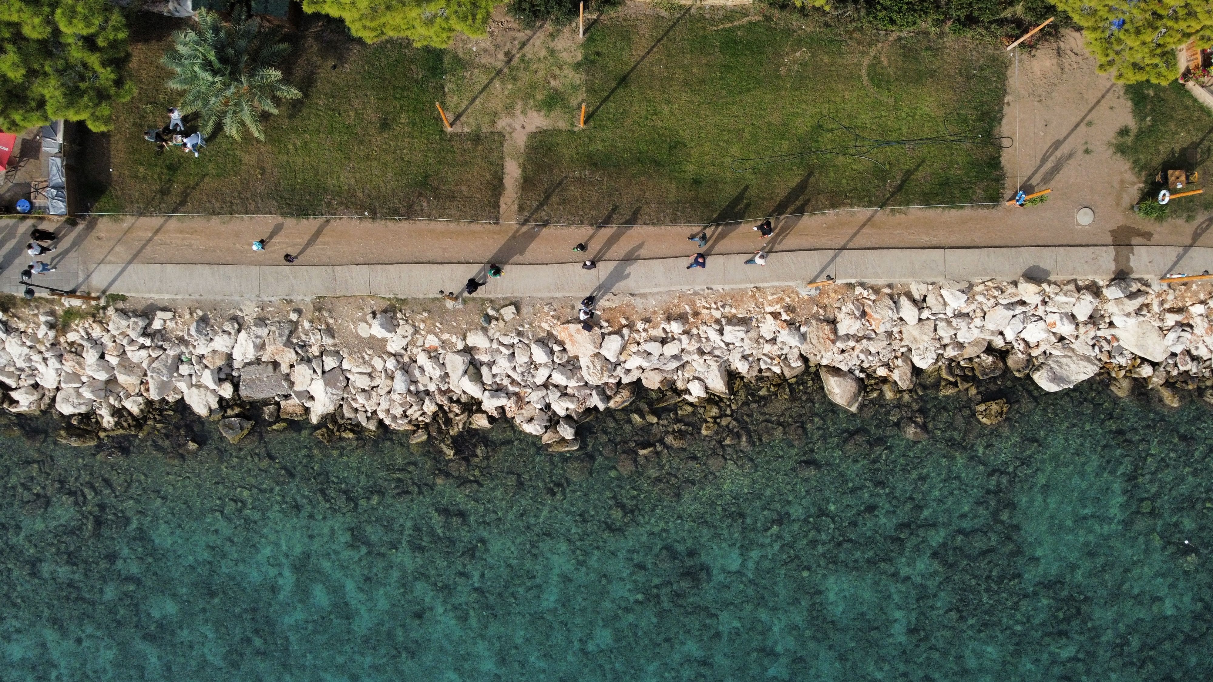 People on Promenade on Shore · Free Stock Photo