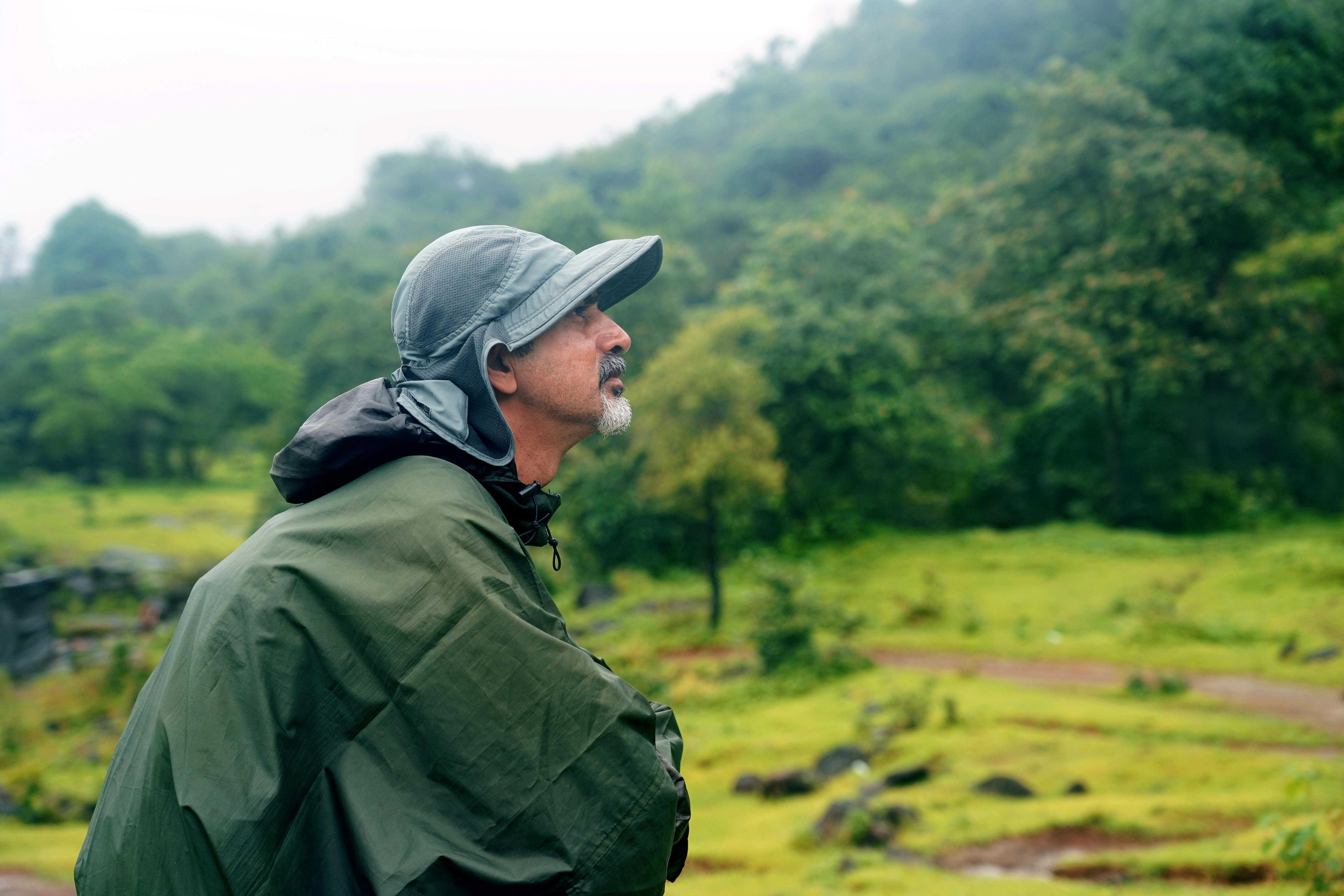 Man in Cap and Raincoat · Free Stock Photo