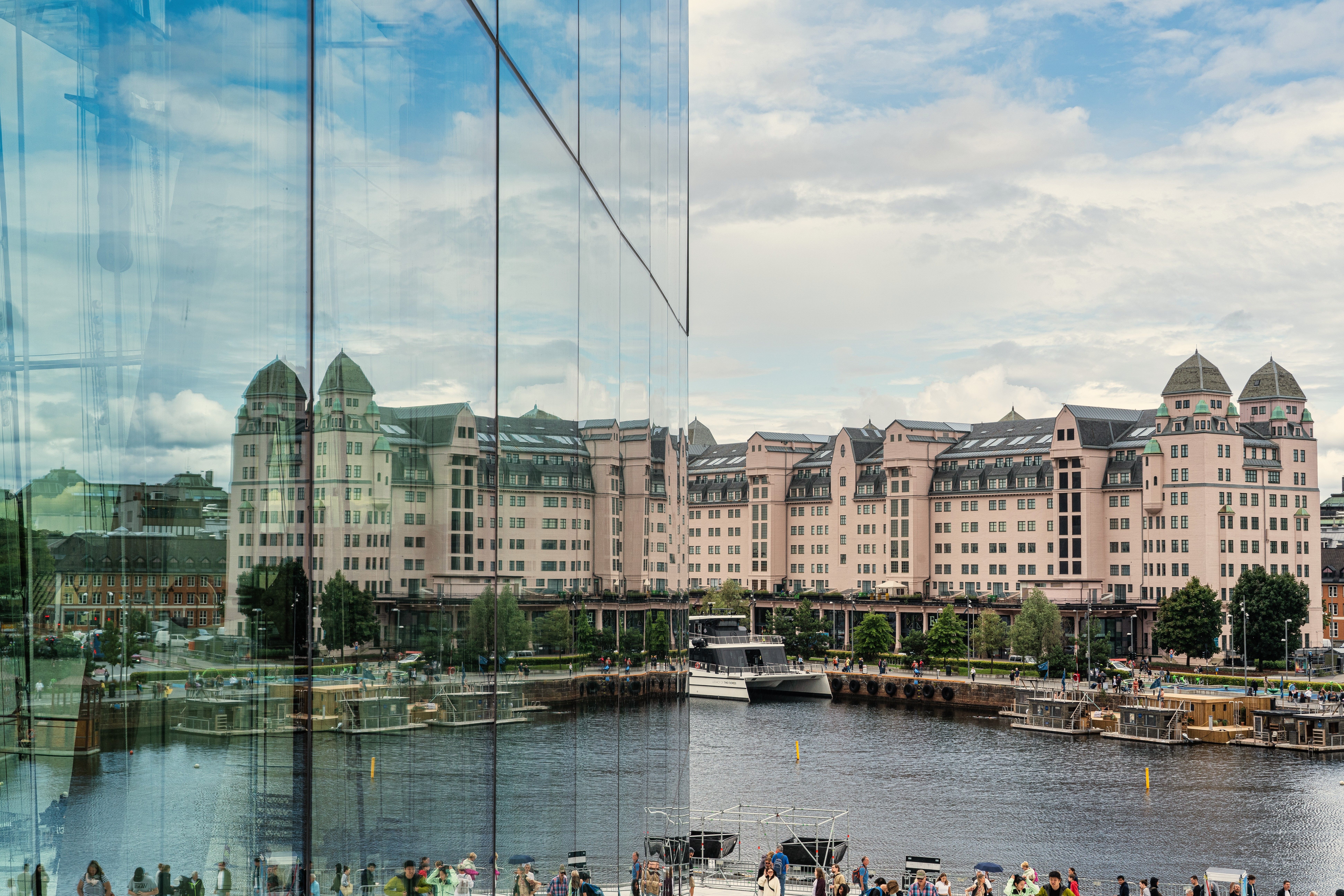 Windows of Office with River and Building behind · Free Stock Photo