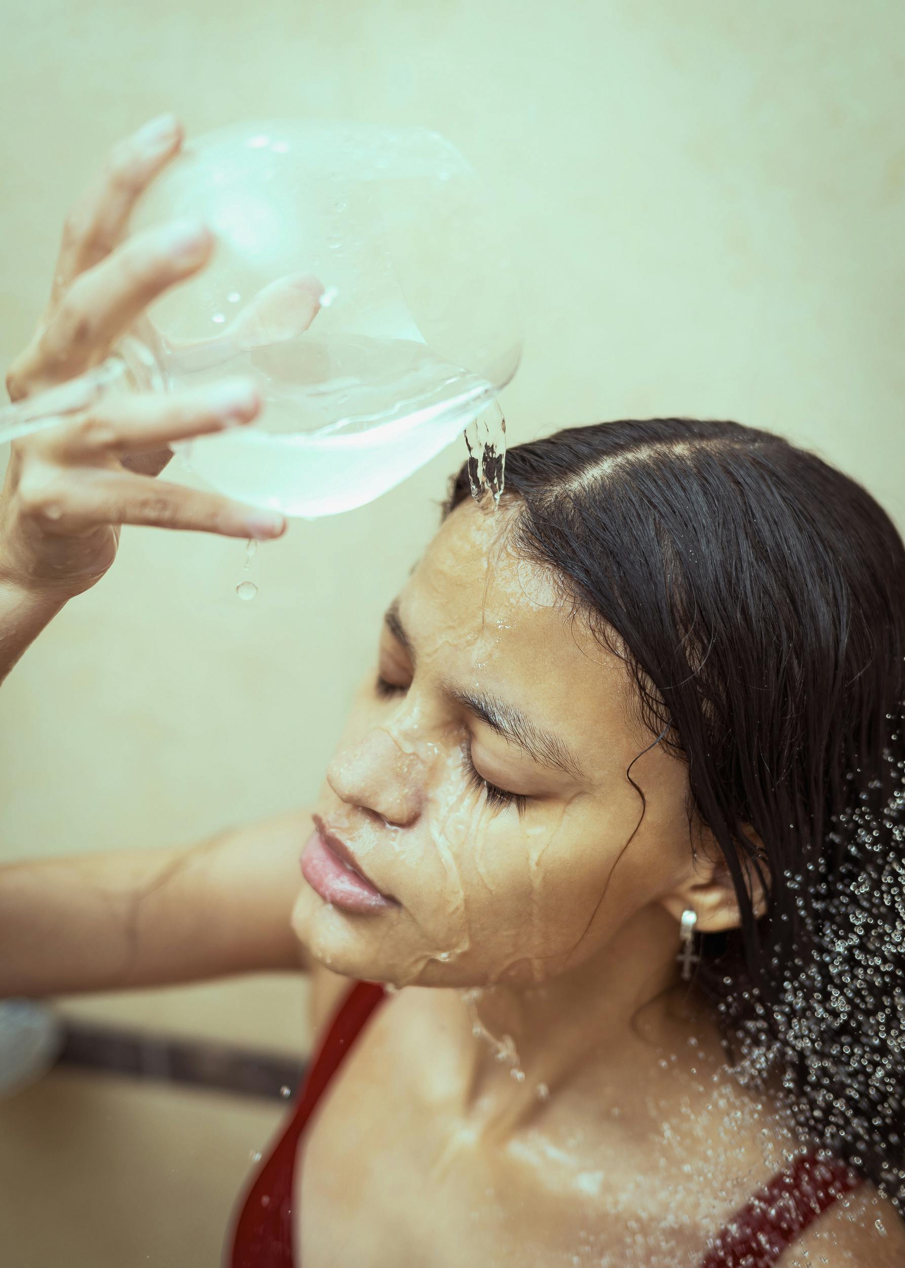 Brunette Woman Pouring Water on Head · Free Stock Photo
