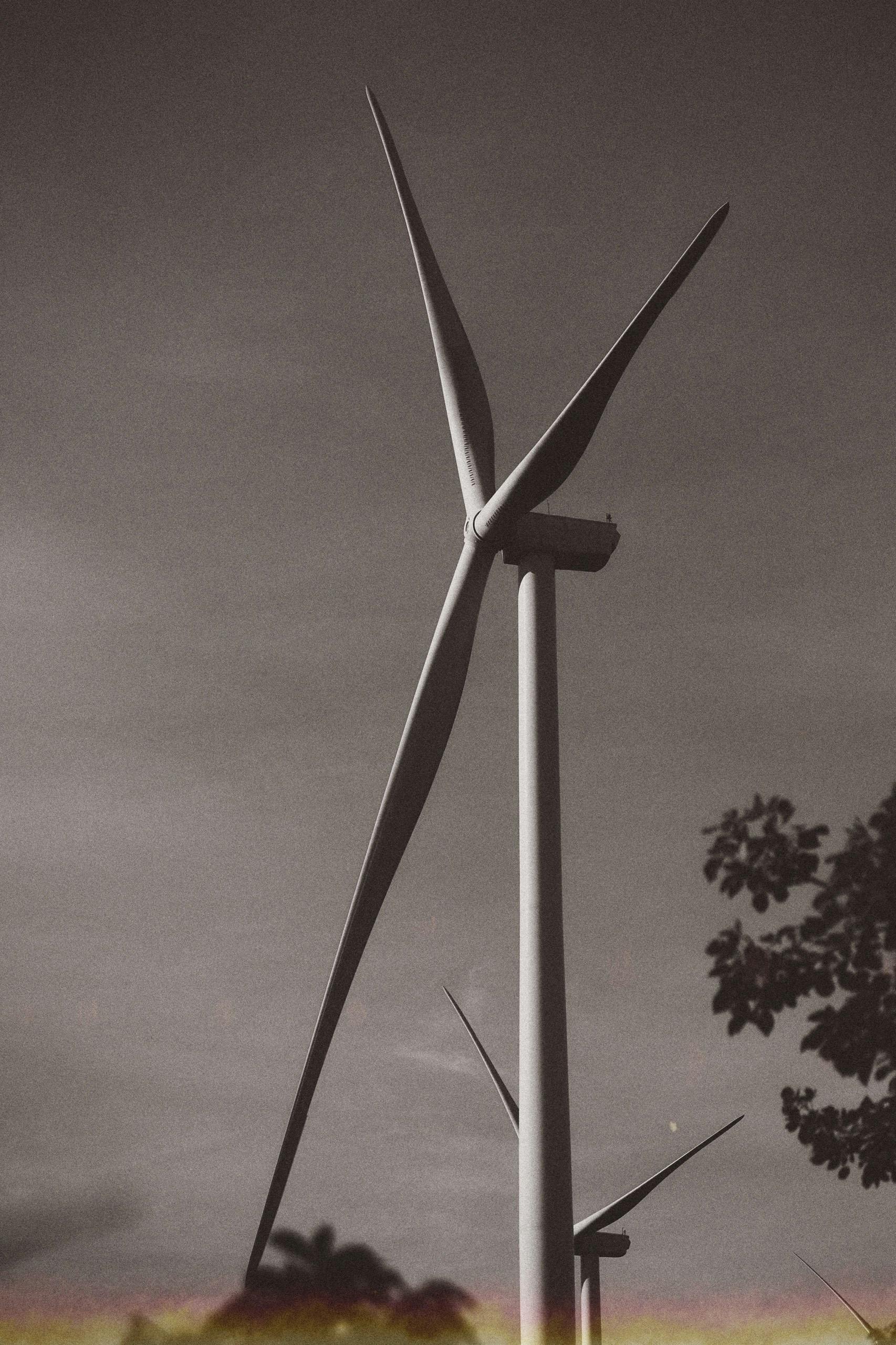 Monochrome Photo of a Windmill Turbine · Free Stock Photo