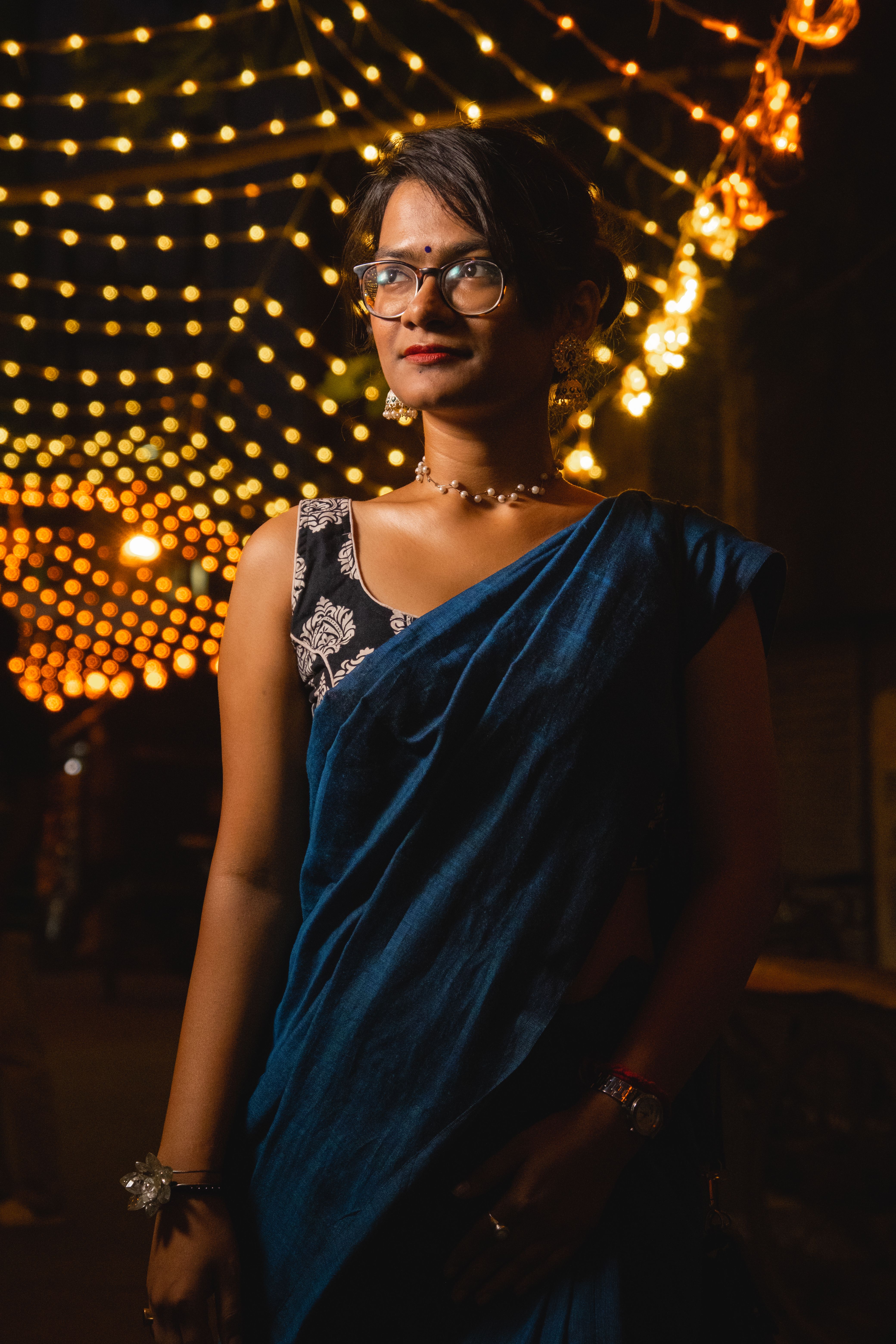 Woman in Traditional Dress at Night · Free Stock Photo