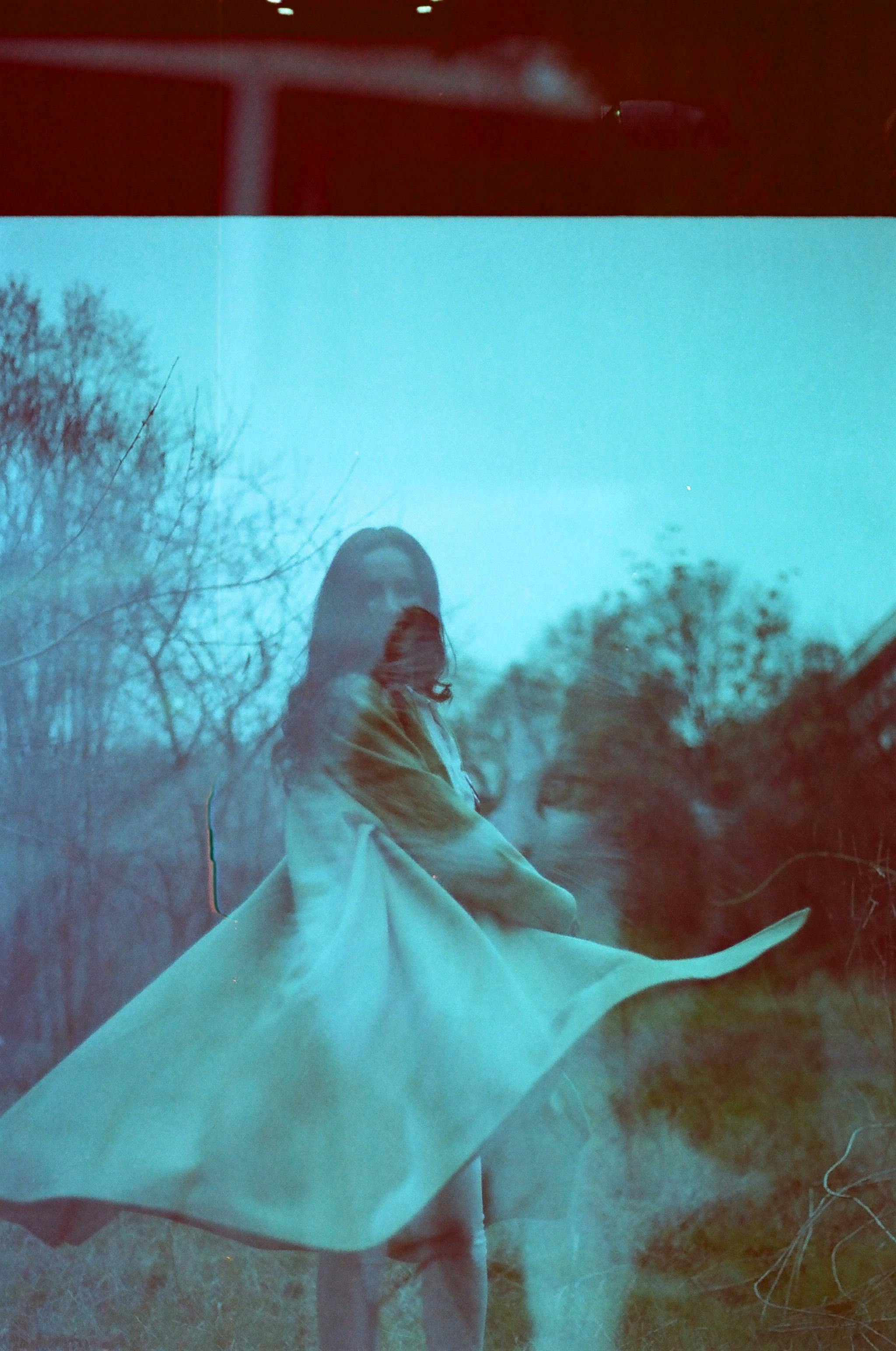 Double Exposure Film Photograph of a Woman · Free Stock Photo