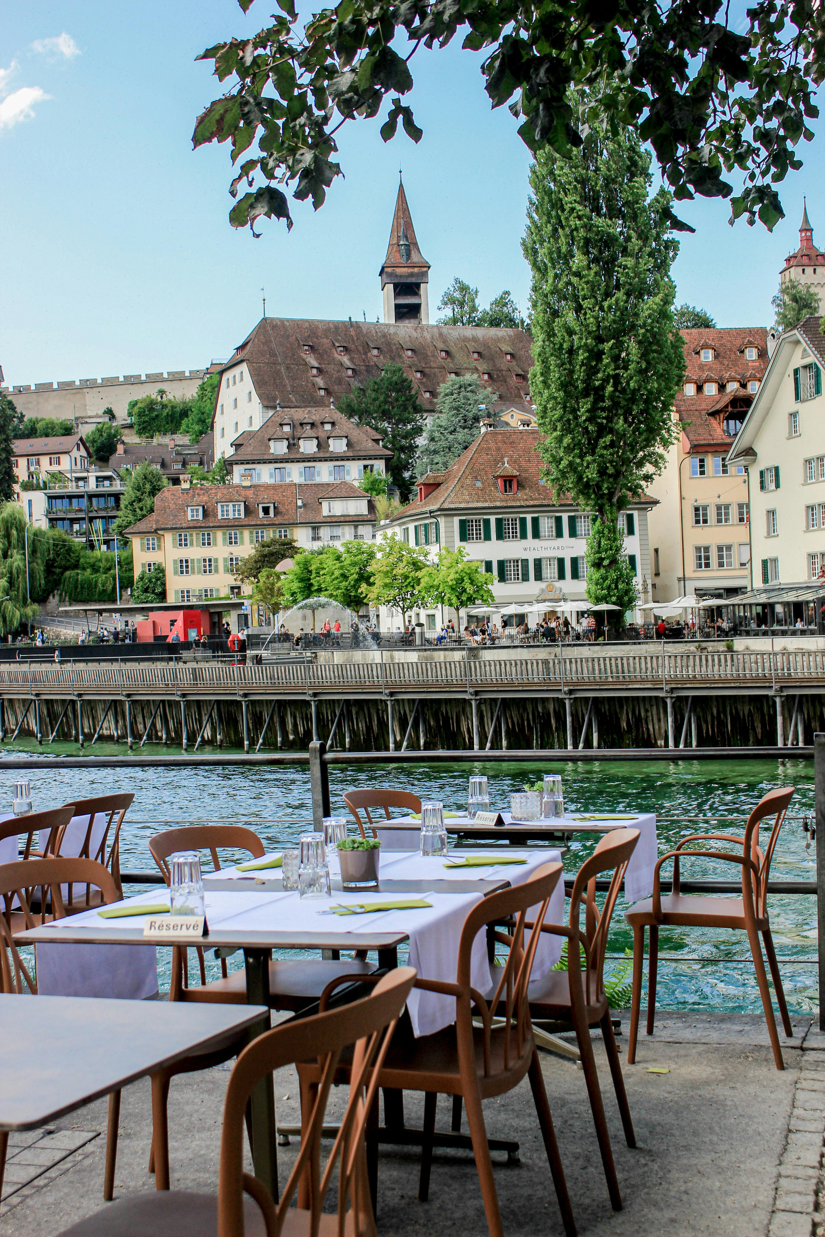 Tables in a Restaurant by the River in Lucerne, Switzerland · Free ...