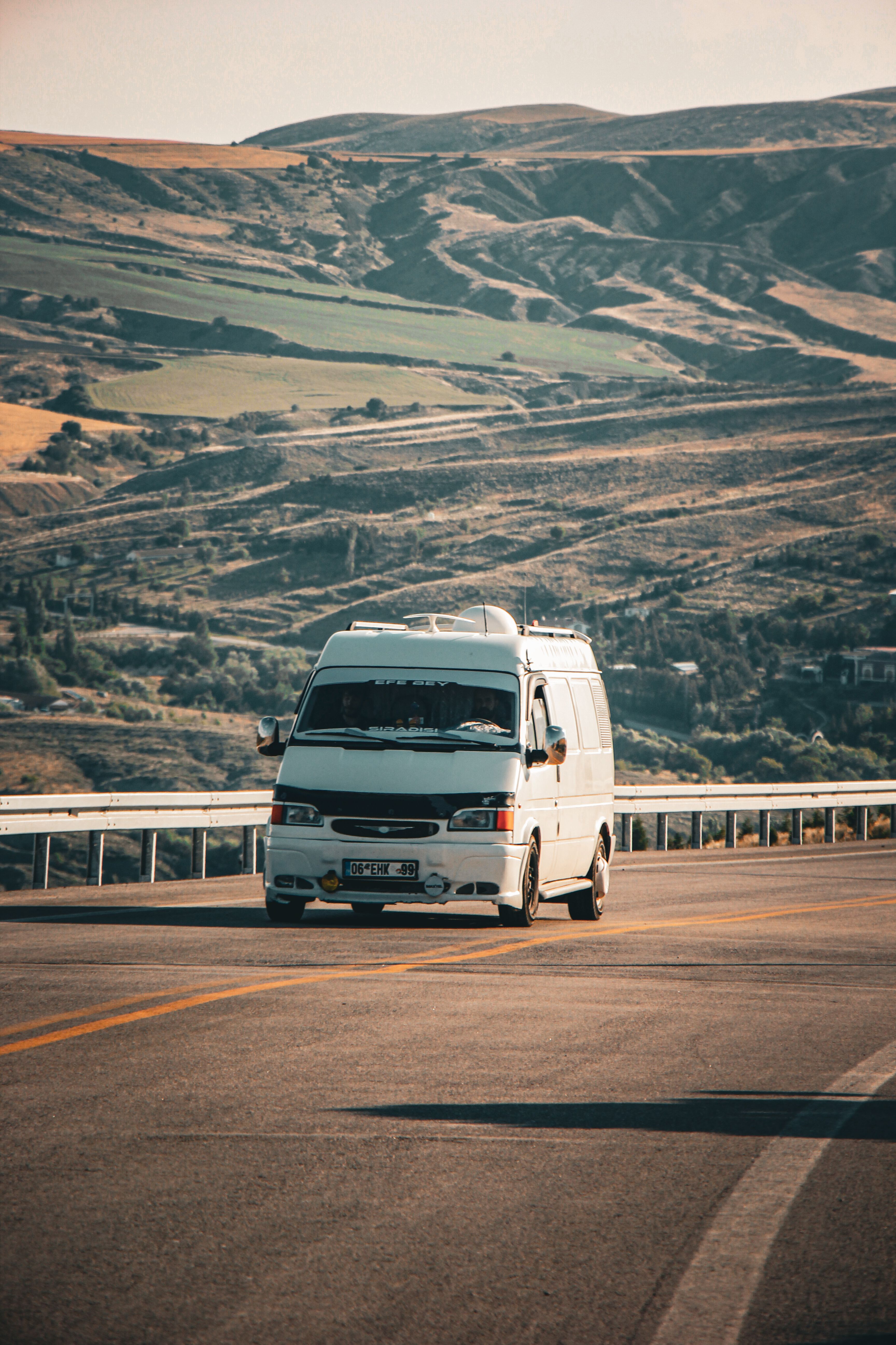 Ford Transit Car on the Highway · Free Stock Photo