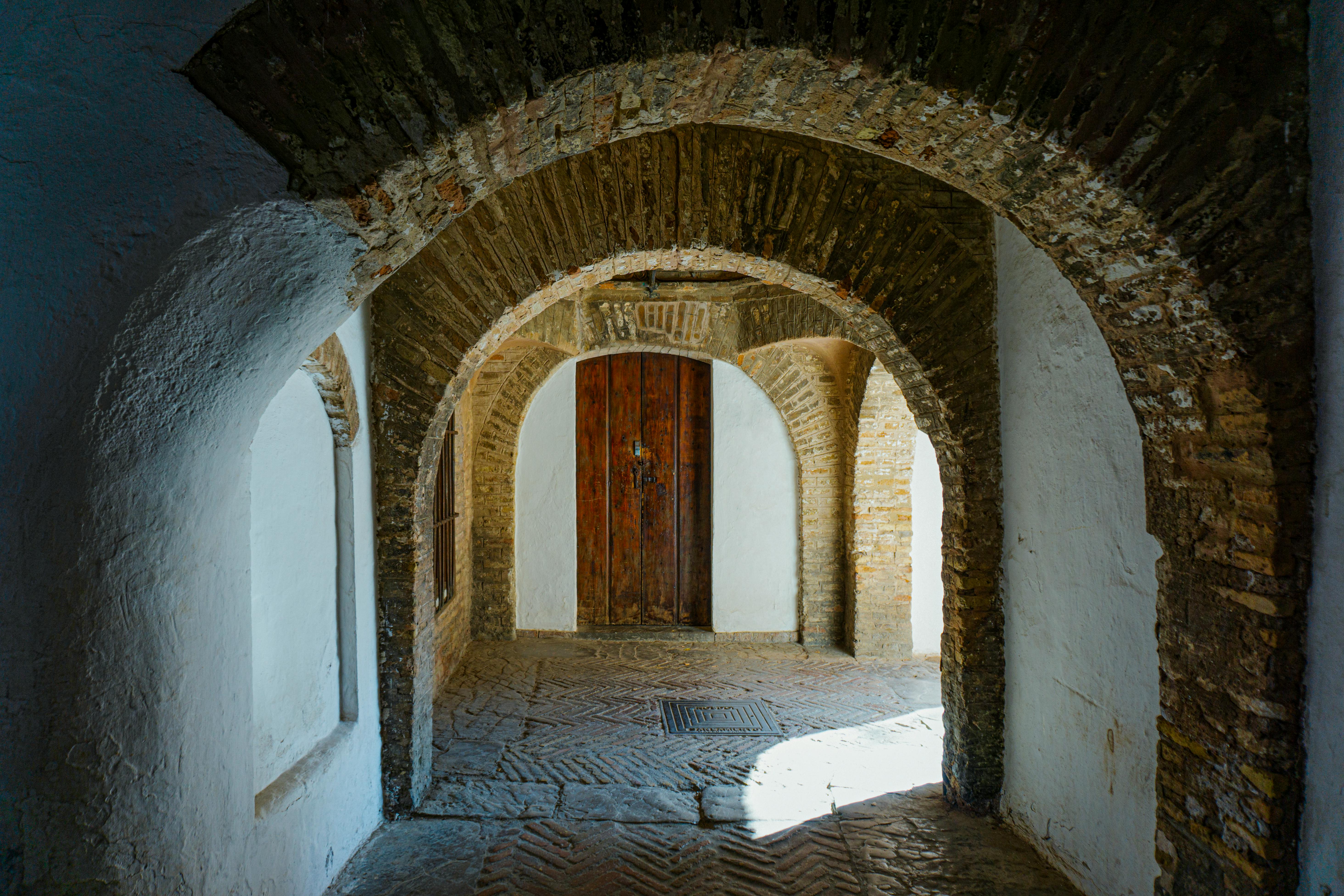 Stone Walls in Medieval Corridor · Free Stock Photo