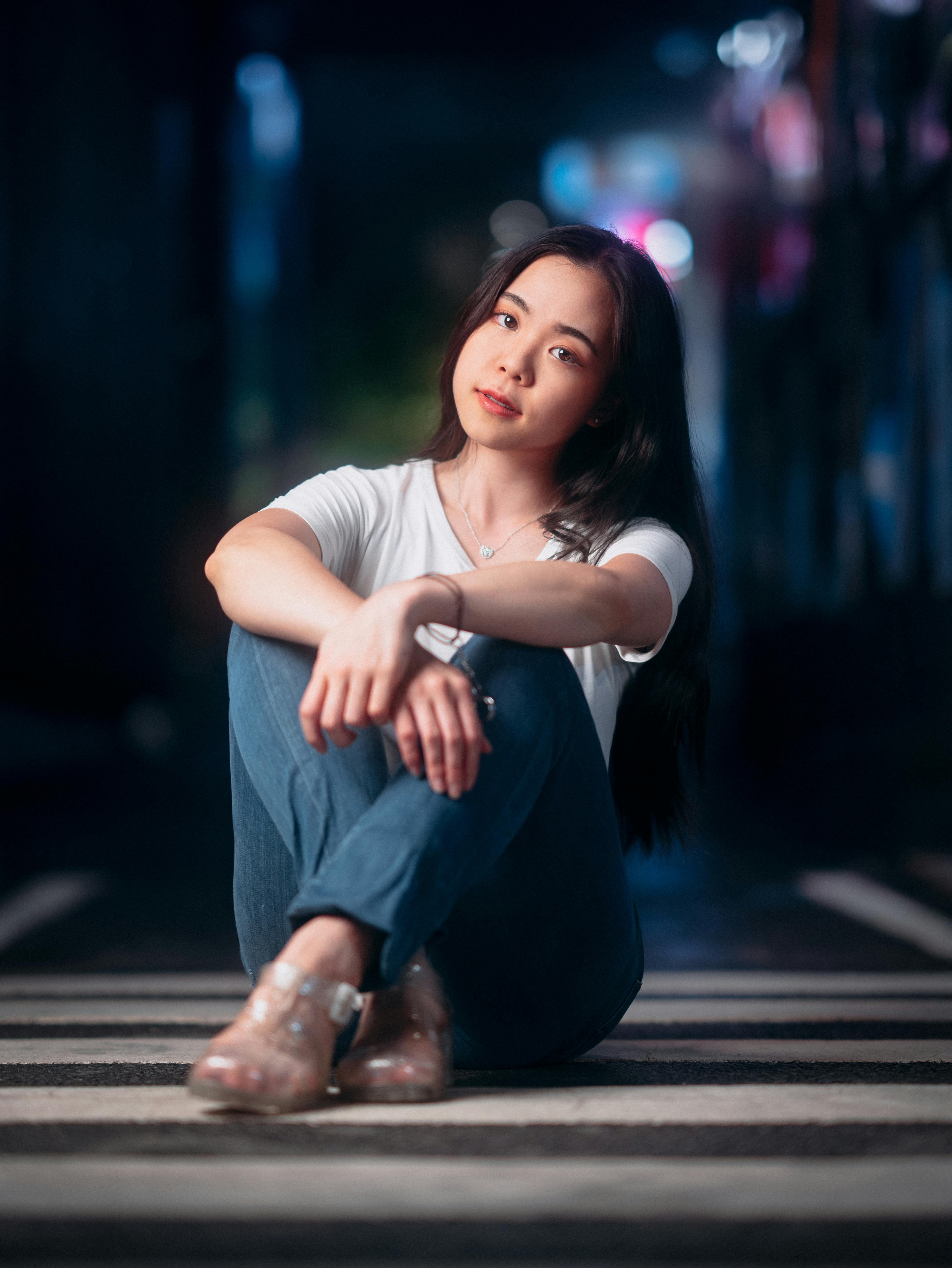 Brunette Woman Posing on Pedestrian Crossing at Night · Free Stock Photo