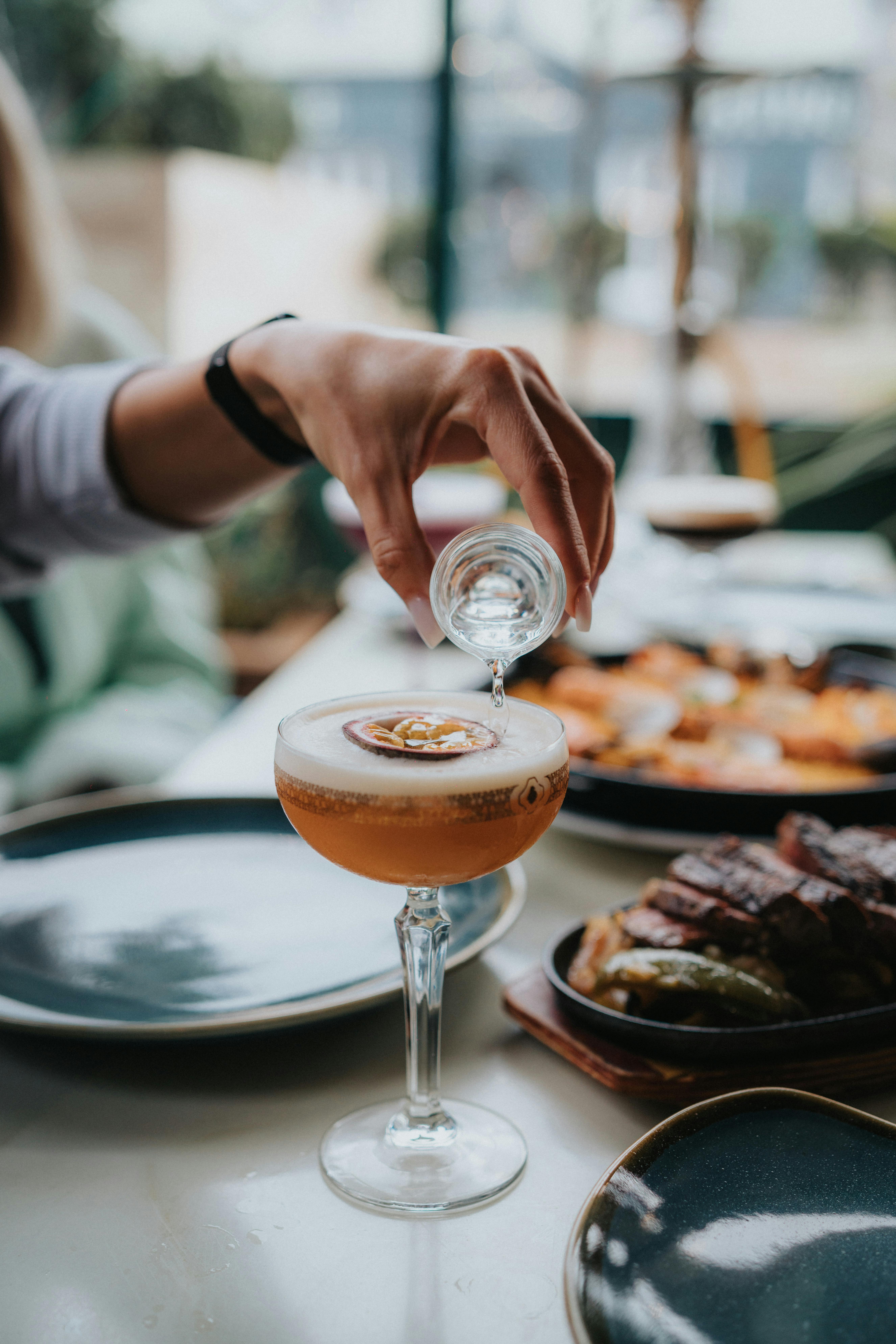 Pouring Liquid in Cocktail in Glass · Free Stock Photo