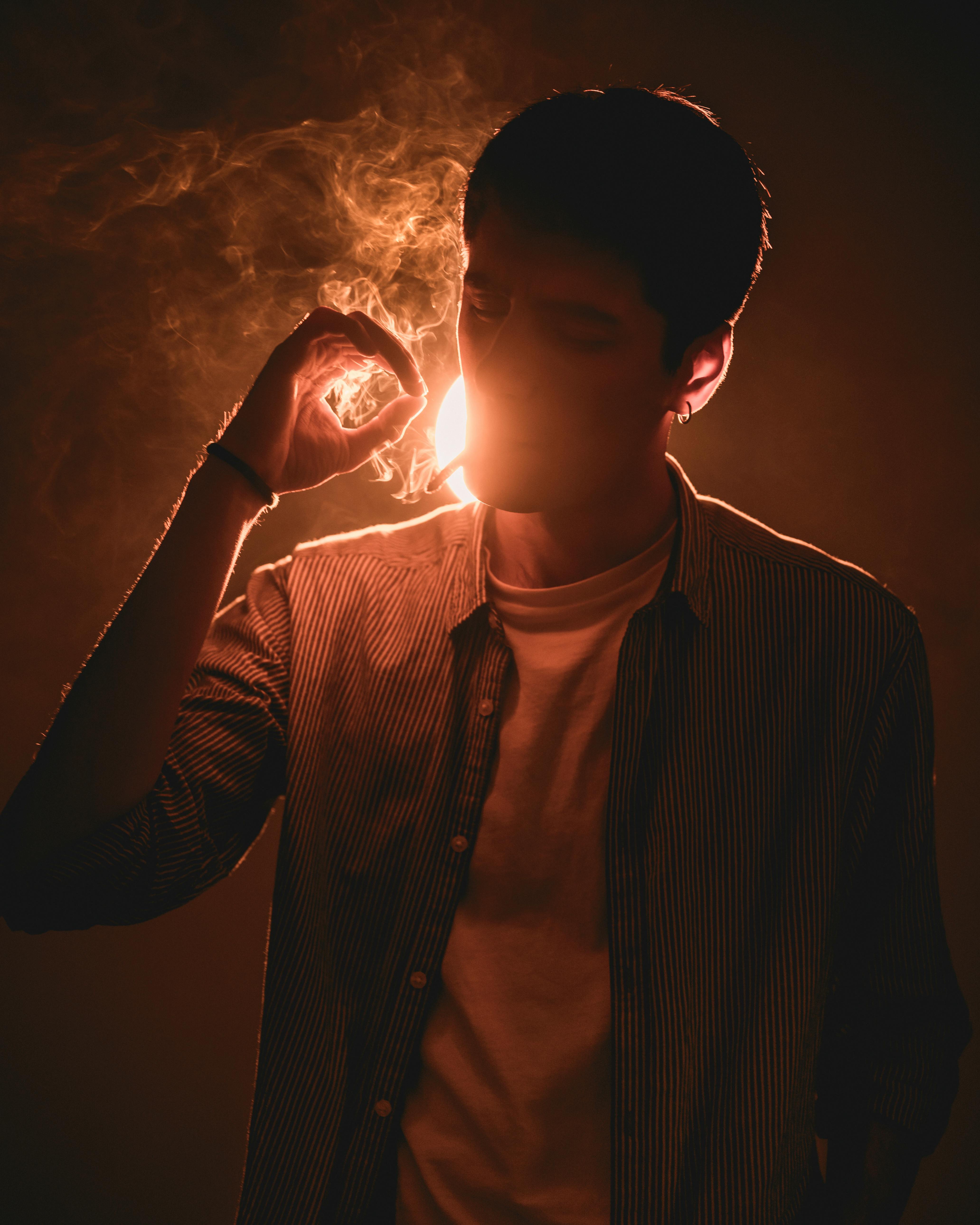Back Lit Smoking Man · Free Stock Photo