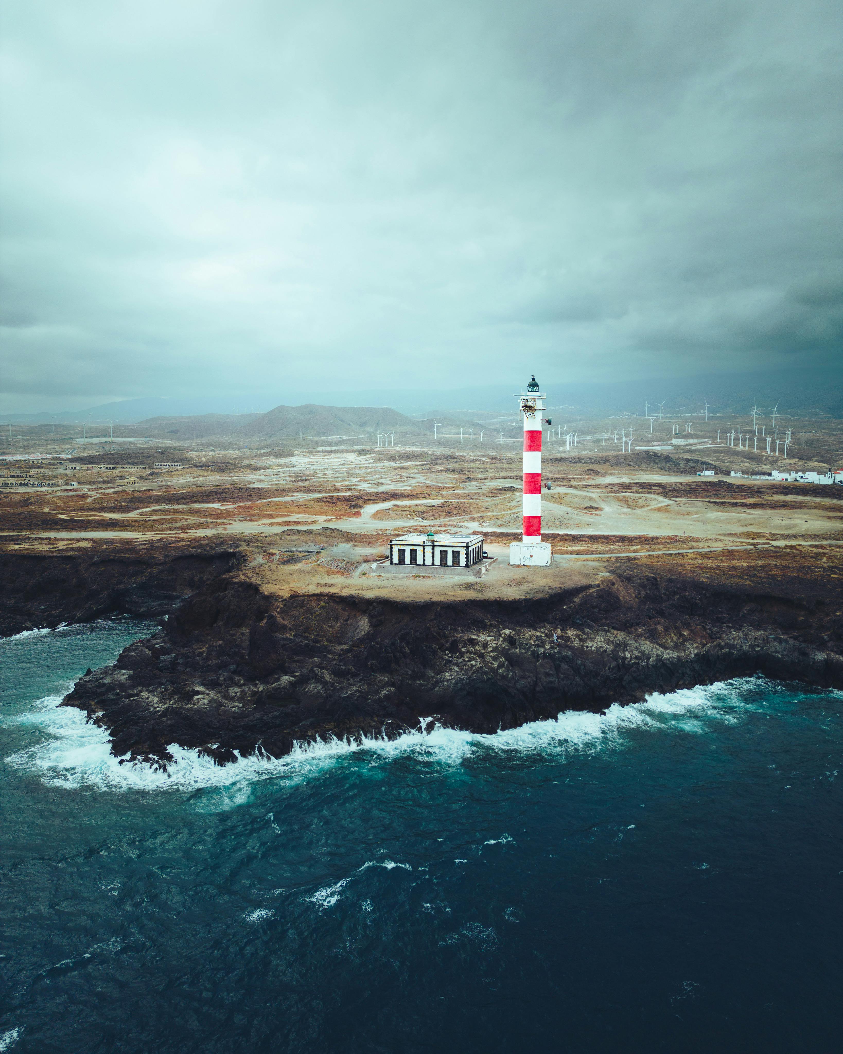 Aerial View of Lighthouse on Icelandic Coastline · Free Stock Photo