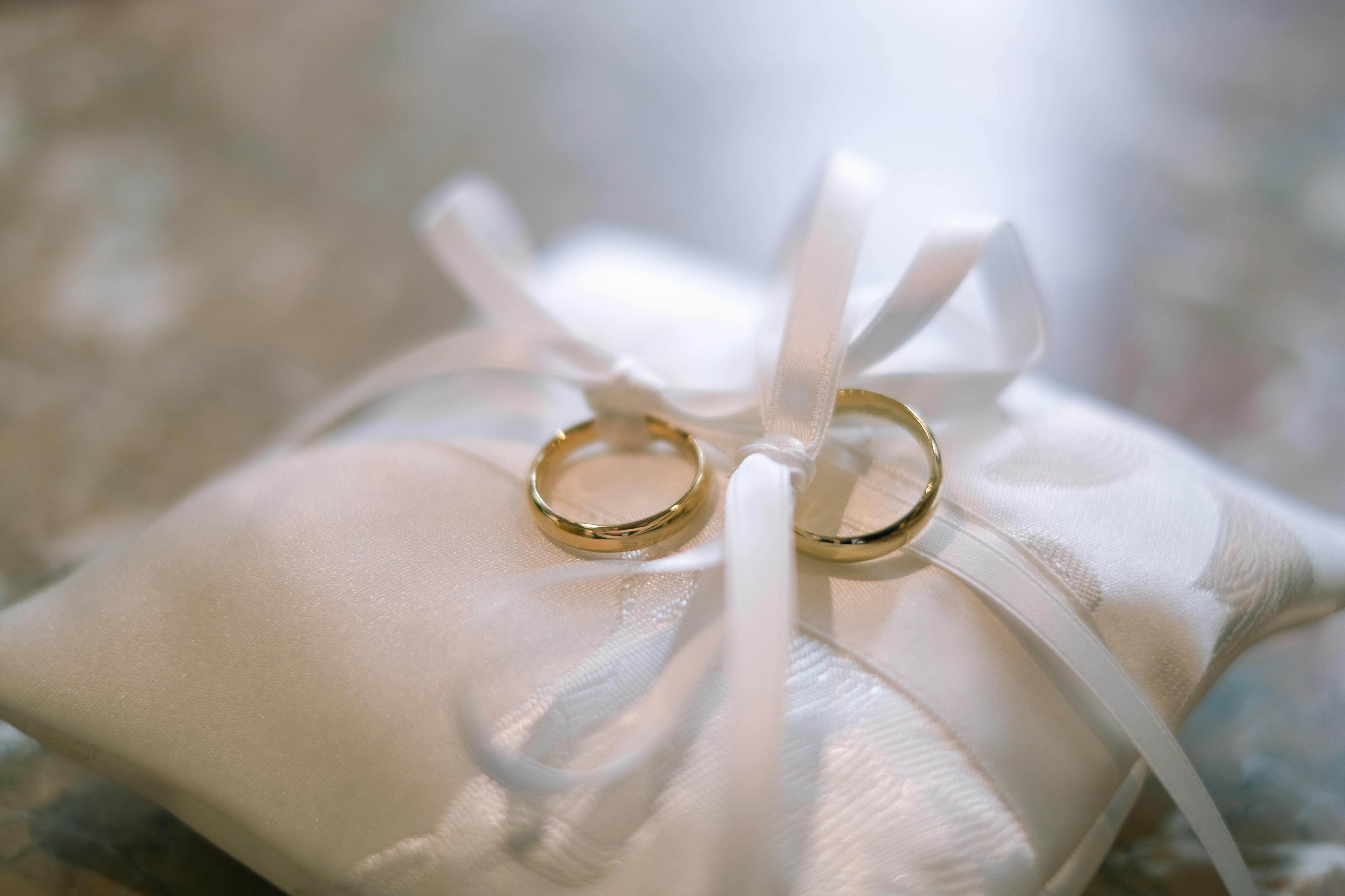 Two Gold Wedding Rings · Free Stock Photo