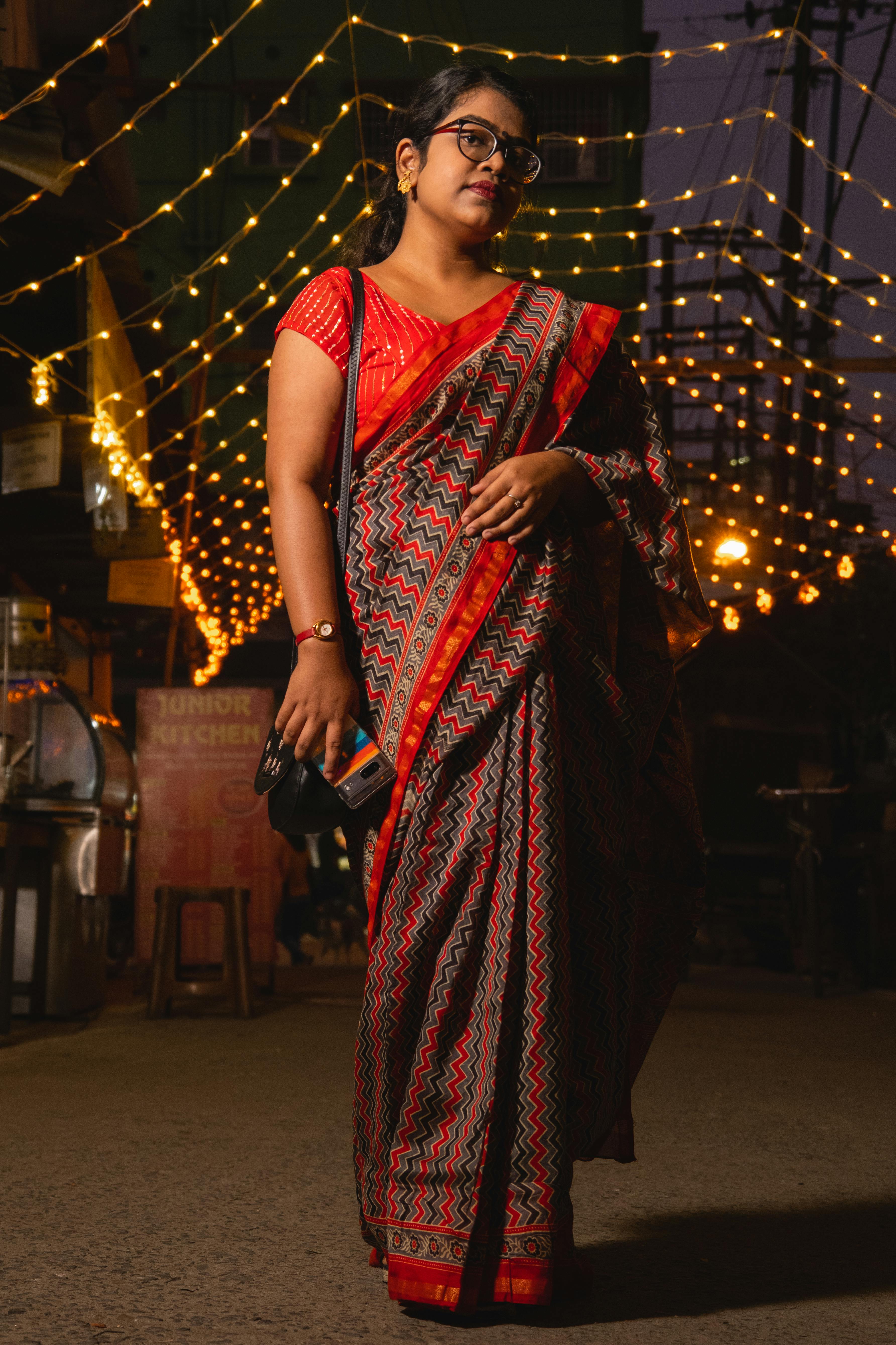 Woman in Traditional Dress at Night · Free Stock Photo