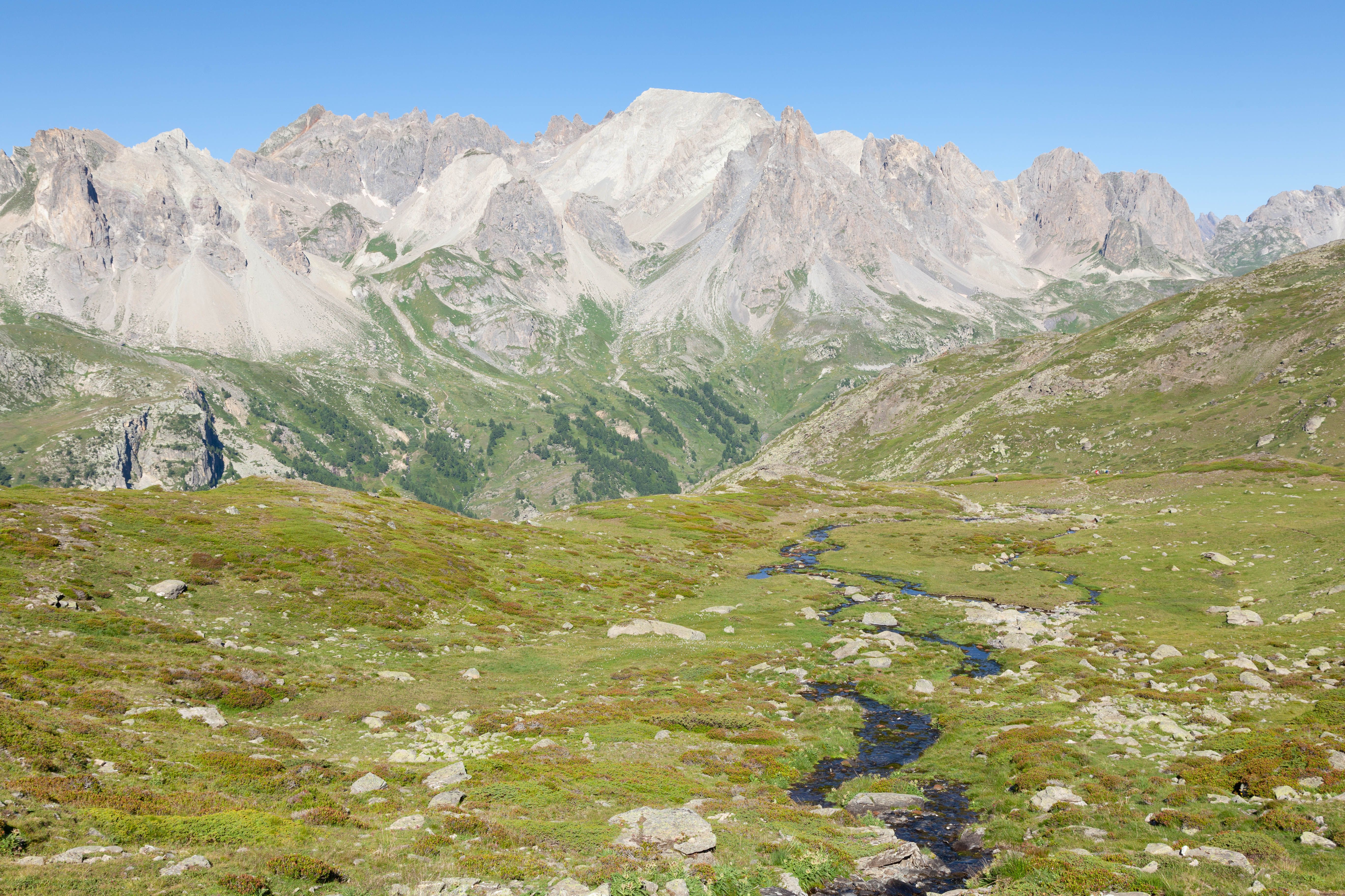 Winding Stream on Meadow in Dolomite Alps · Free Stock Photo
