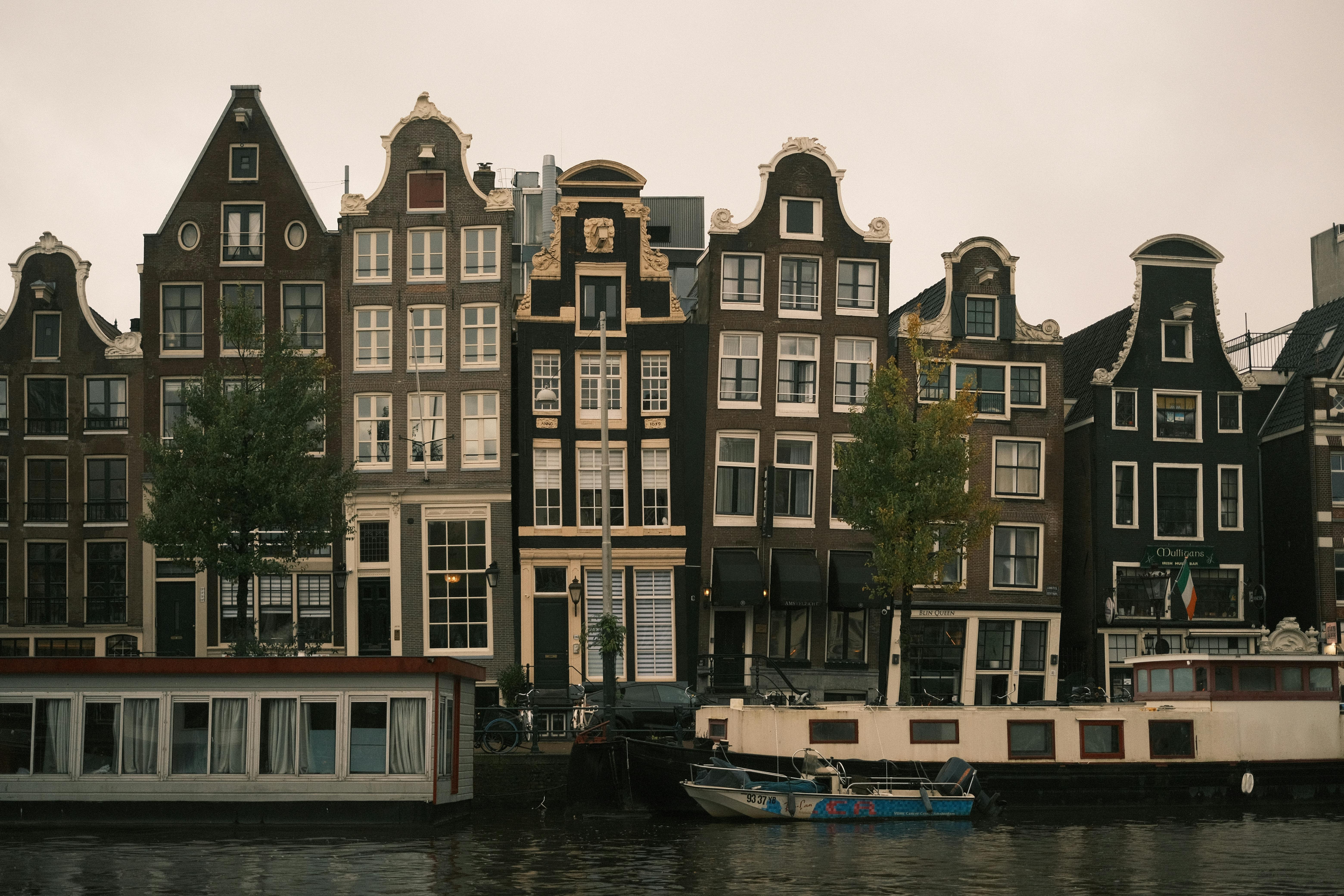 Waterfront Houses by the Canal in Amsterdam, the Netherlands · Free ...