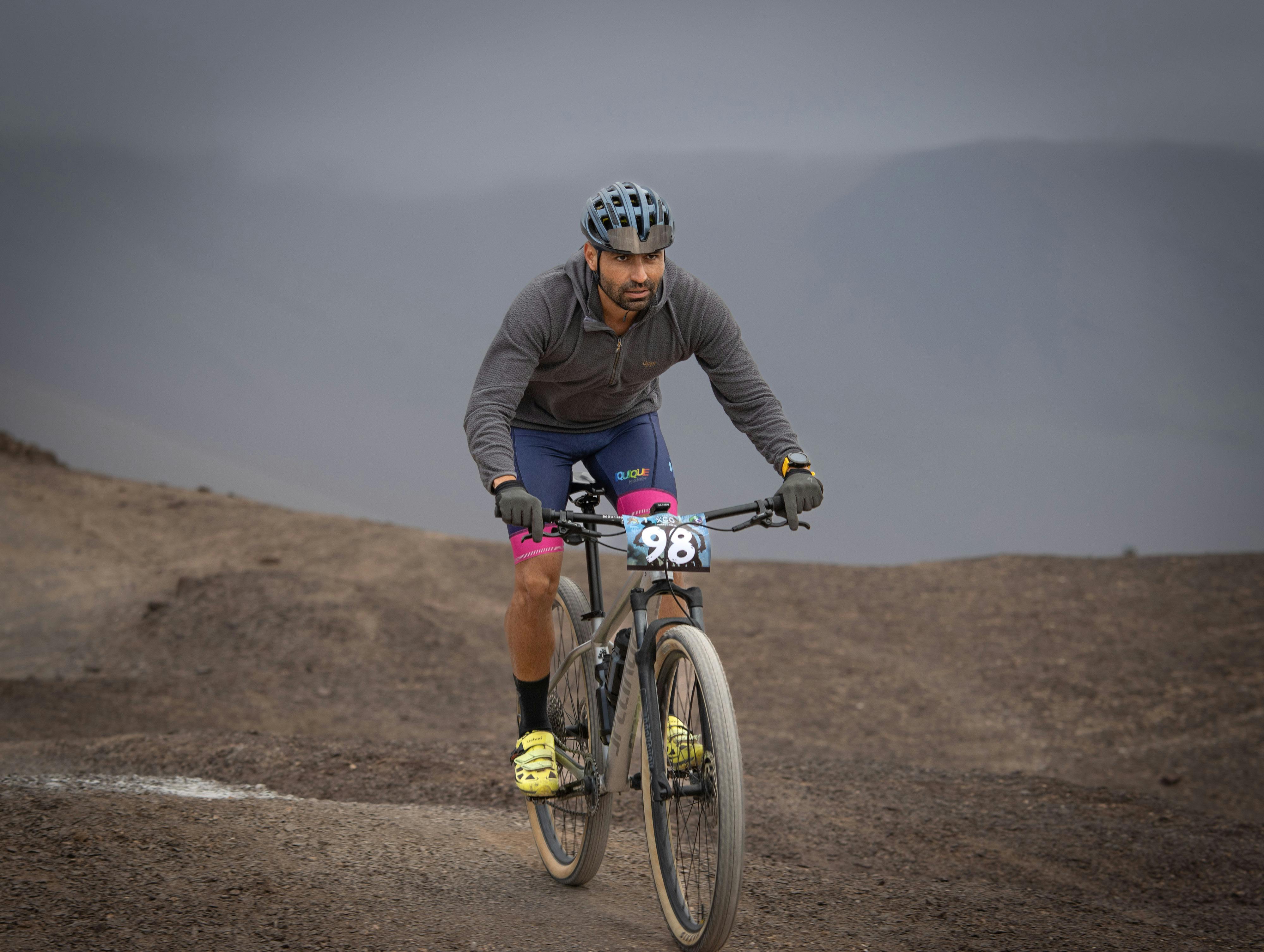 Photo of a Man Mountain Bike Racing · Free Stock Photo