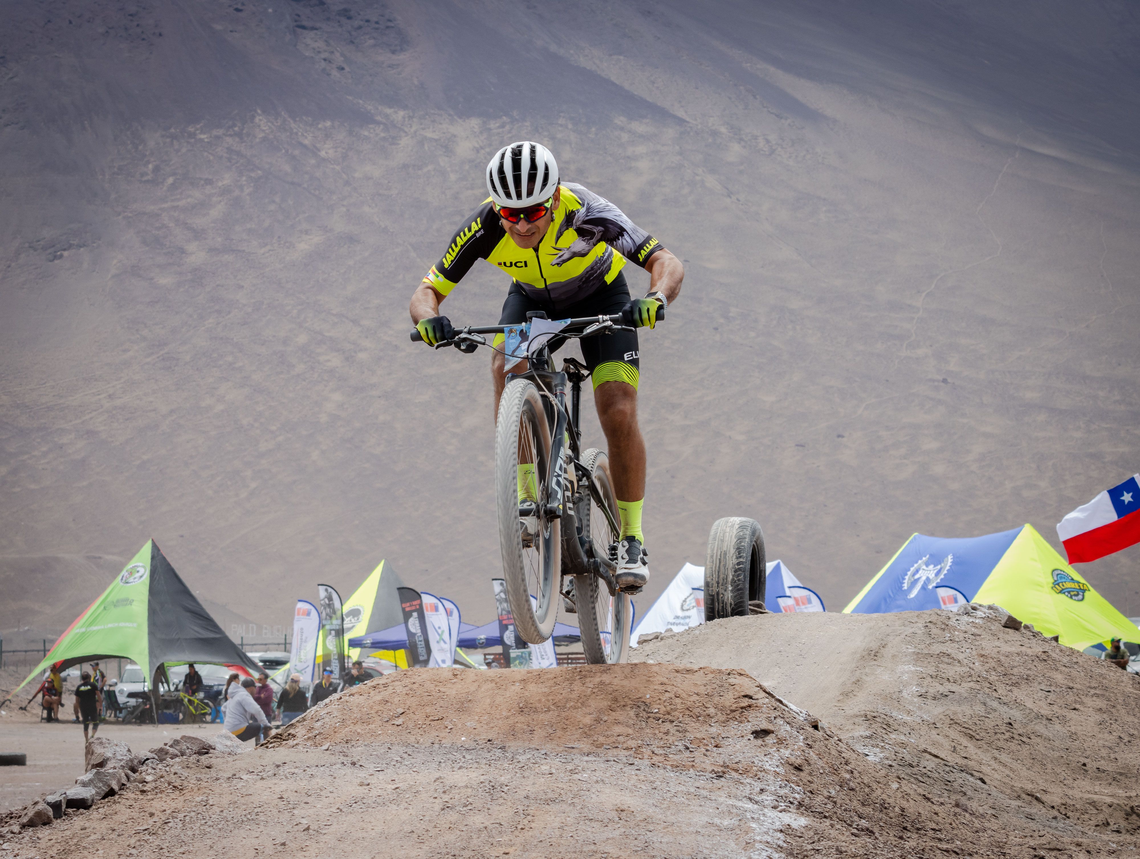 Woman Riding Bicycle in an Off Road Competition · Free Stock Photo