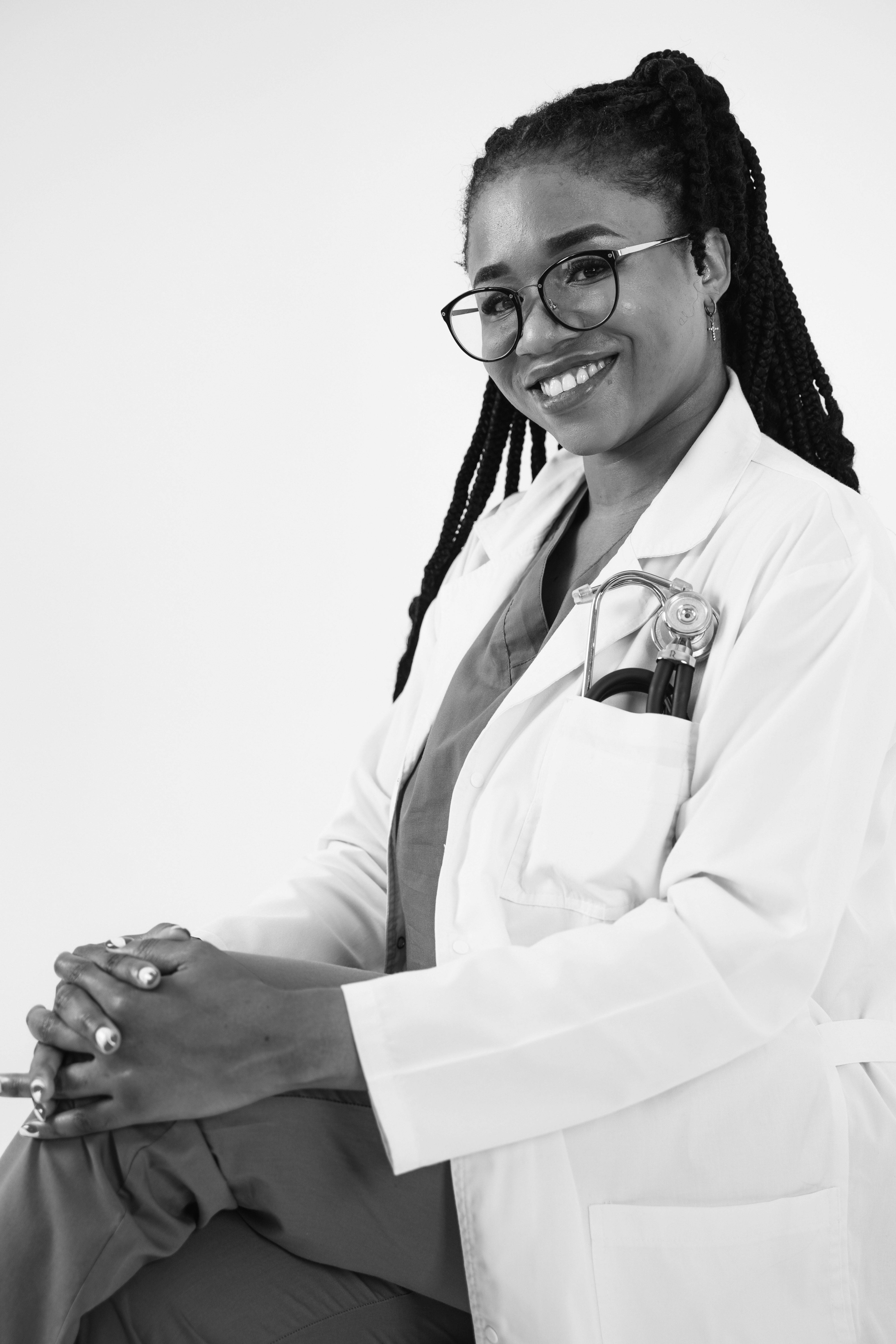 Confident Smiling Doctor · Free Stock Photo