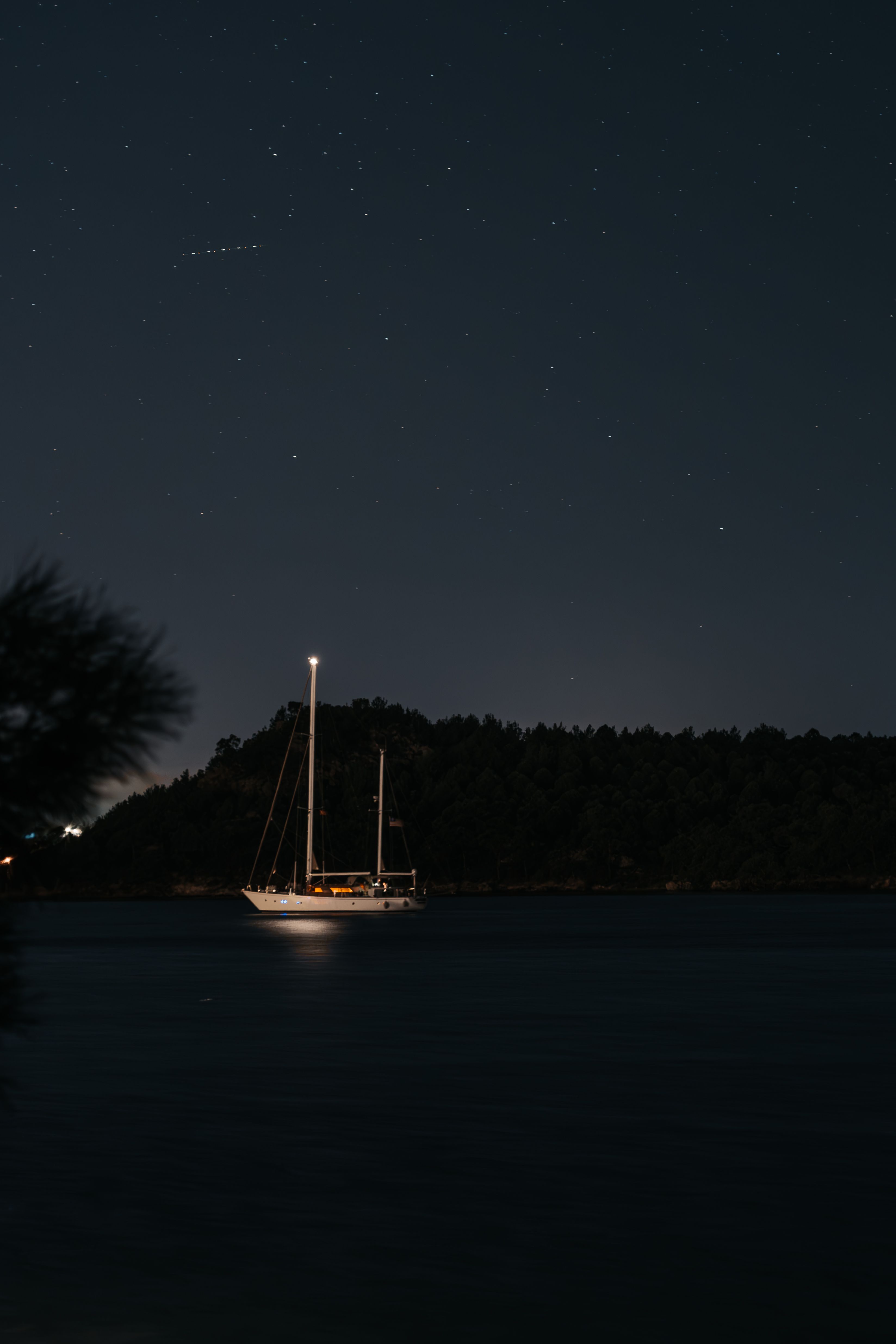 Sailboat Illuminated at Night · Free Stock Photo