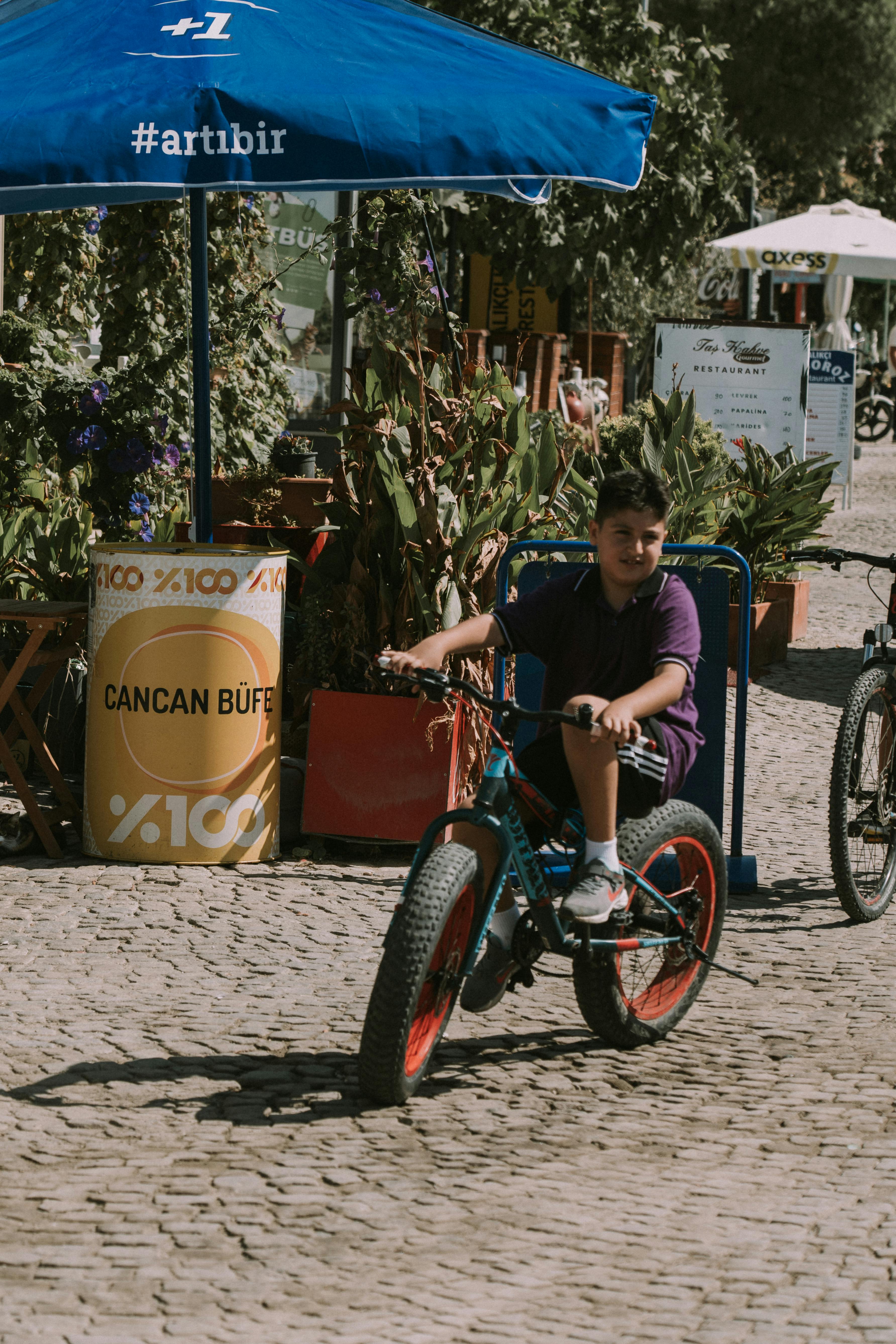 Boy Riding Bike at Daytime · Free Stock Photo