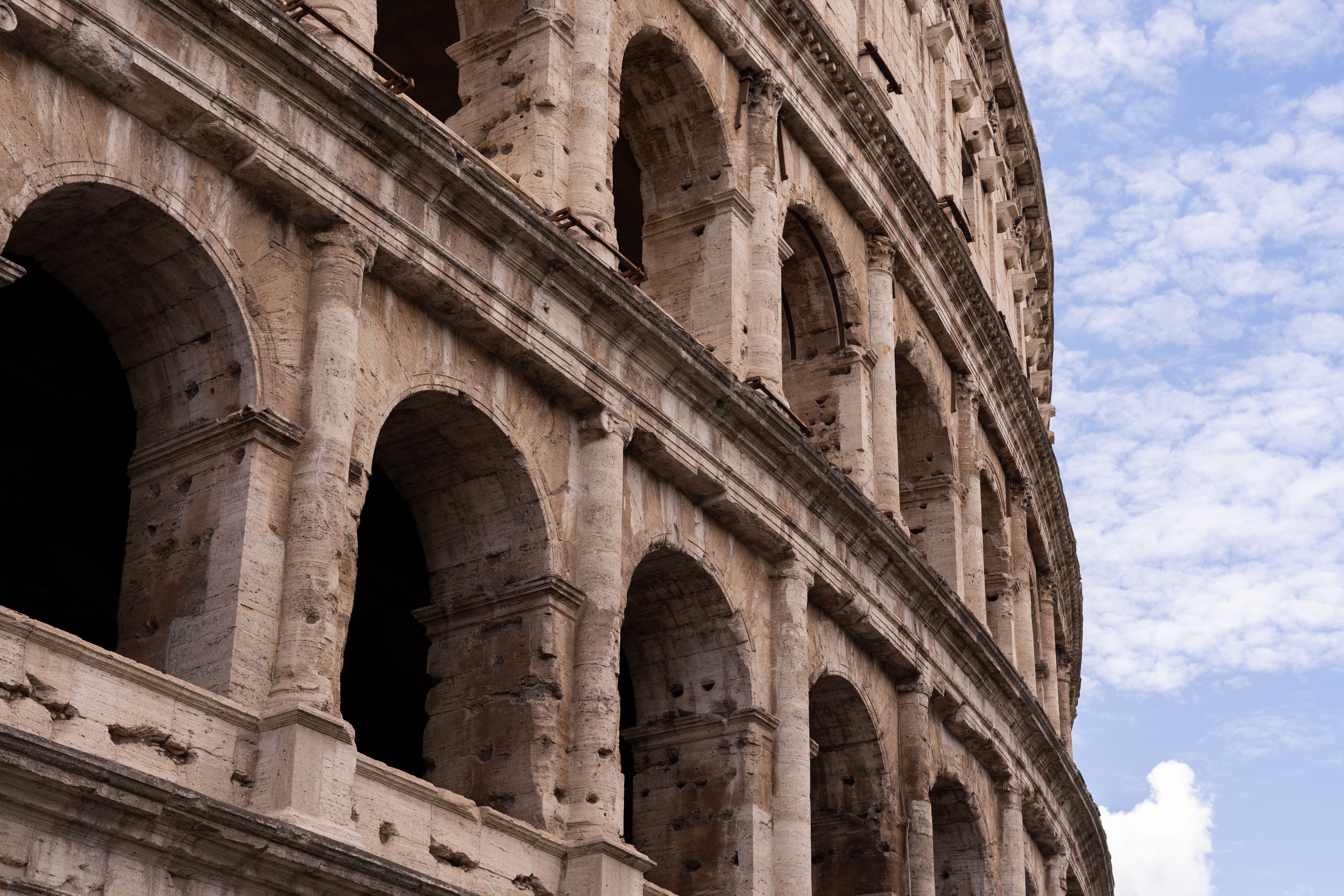Close-up of the iconic Roman Colosseum architecture · Free Stock Photo