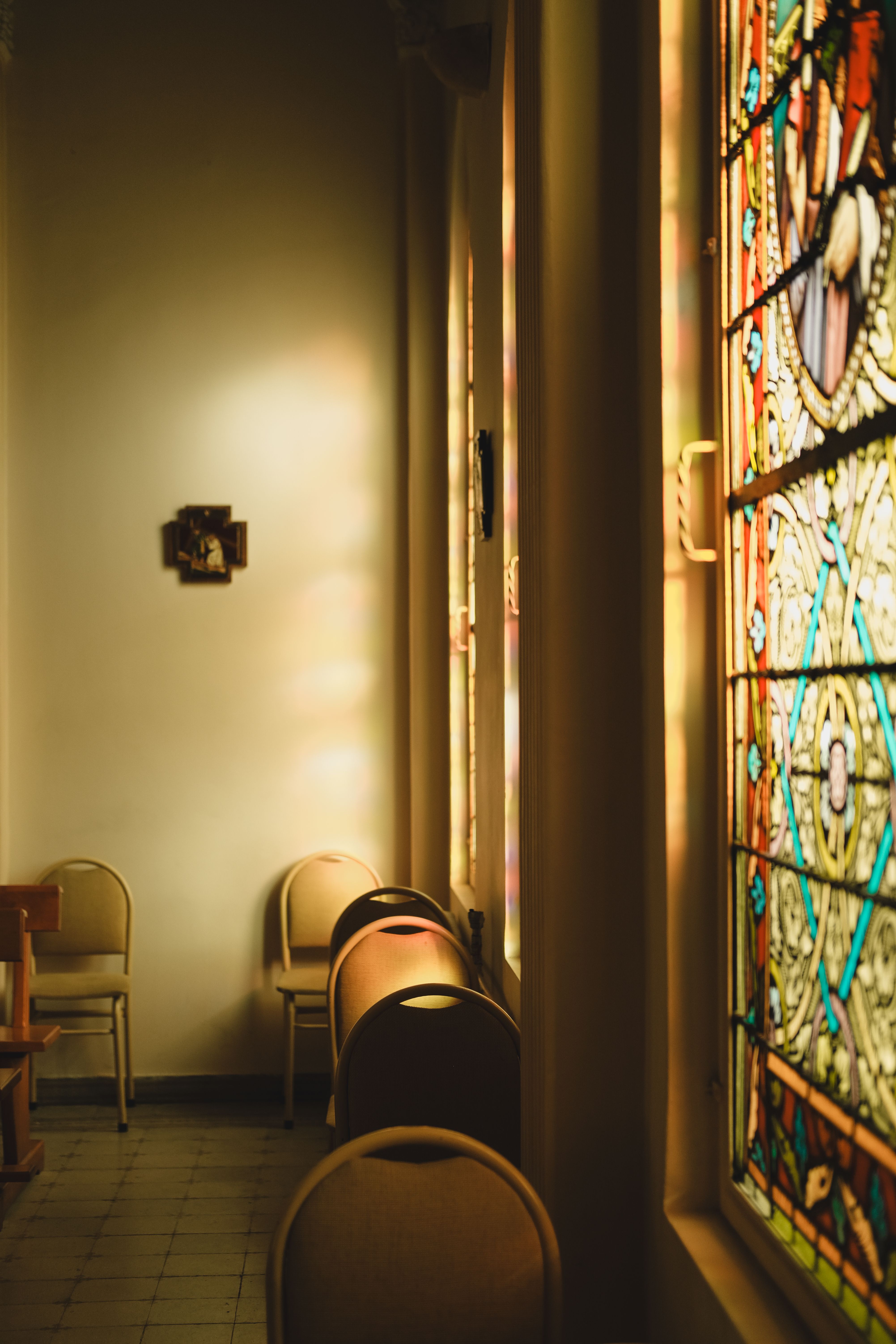 Wooden Chairs Under the Stained Glass Windows of the St Willibrordus ...