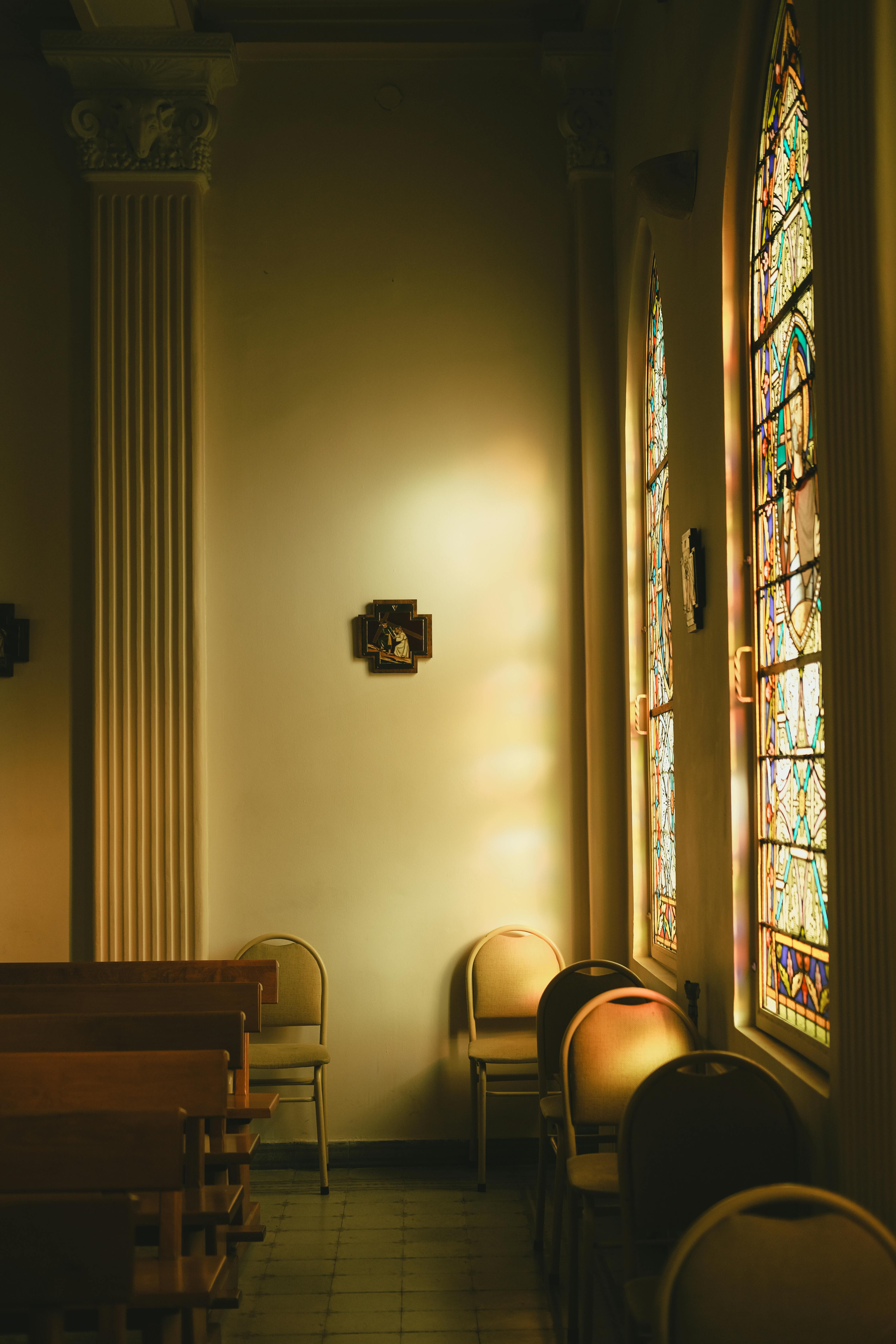 Church Interior with Stained Glass Window · Free Stock Photo