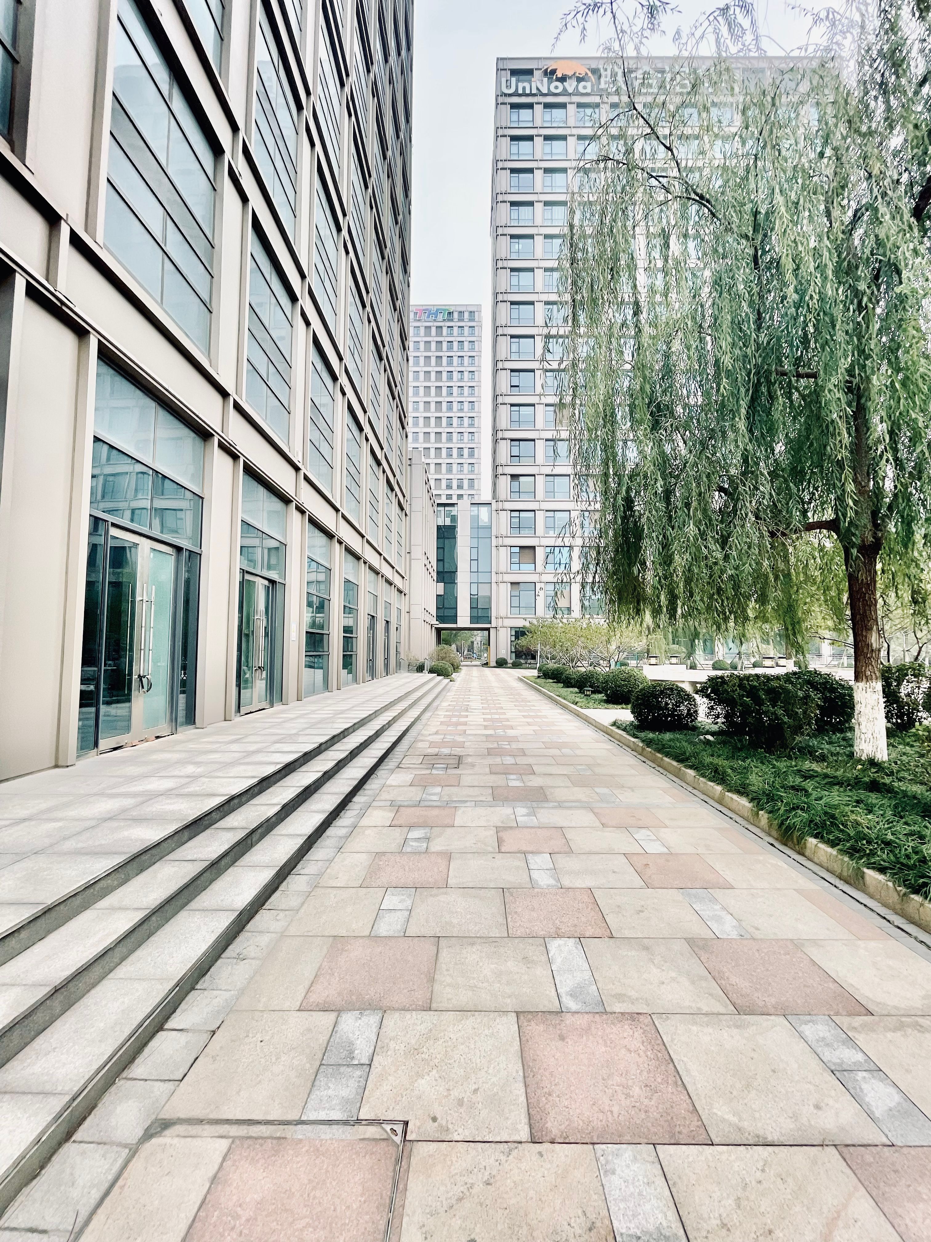 Sidewalk by a Modern Building in City · Free Stock Photo