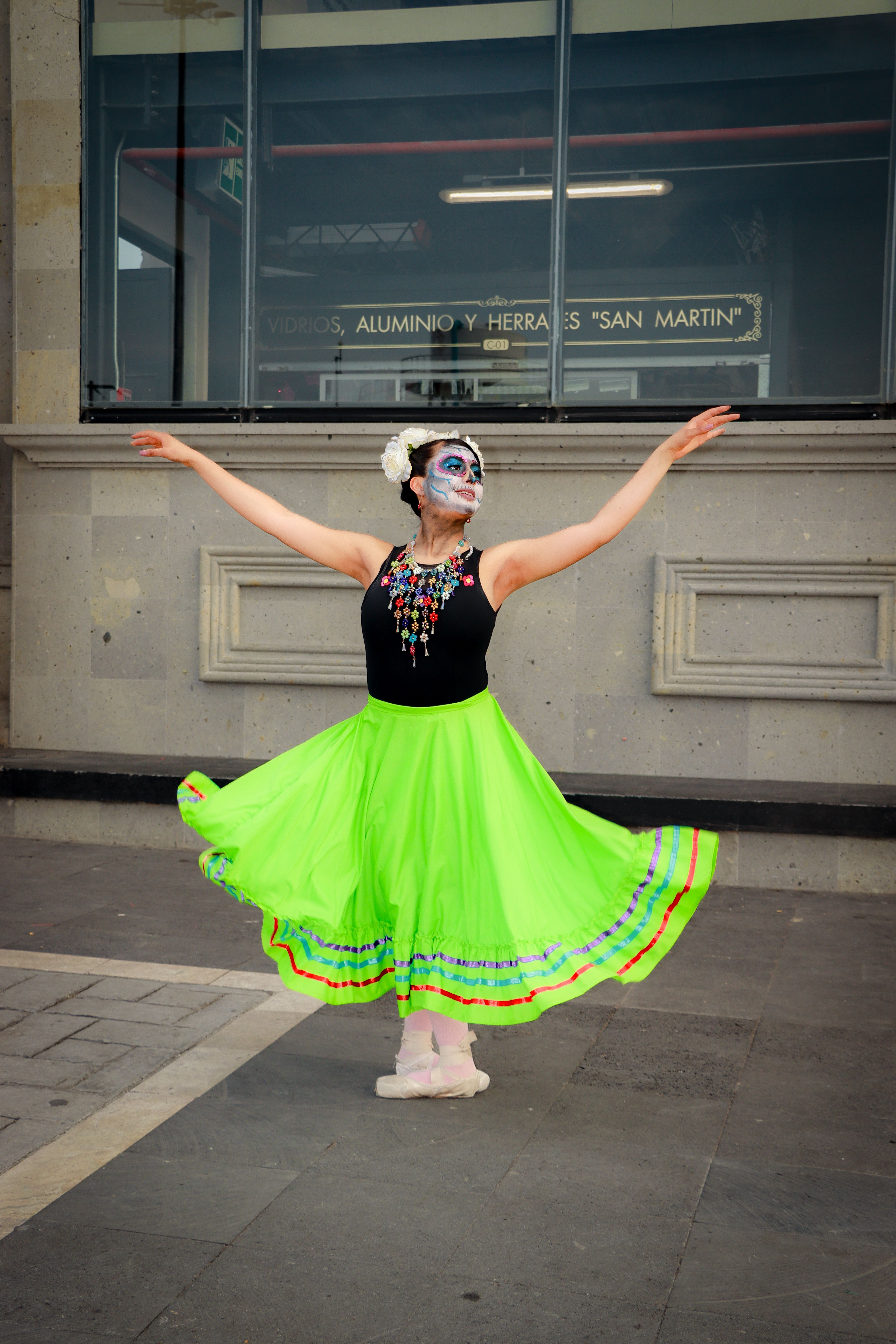 Woman Dressed as a Catrina Dancing Outside · Free Stock Photo