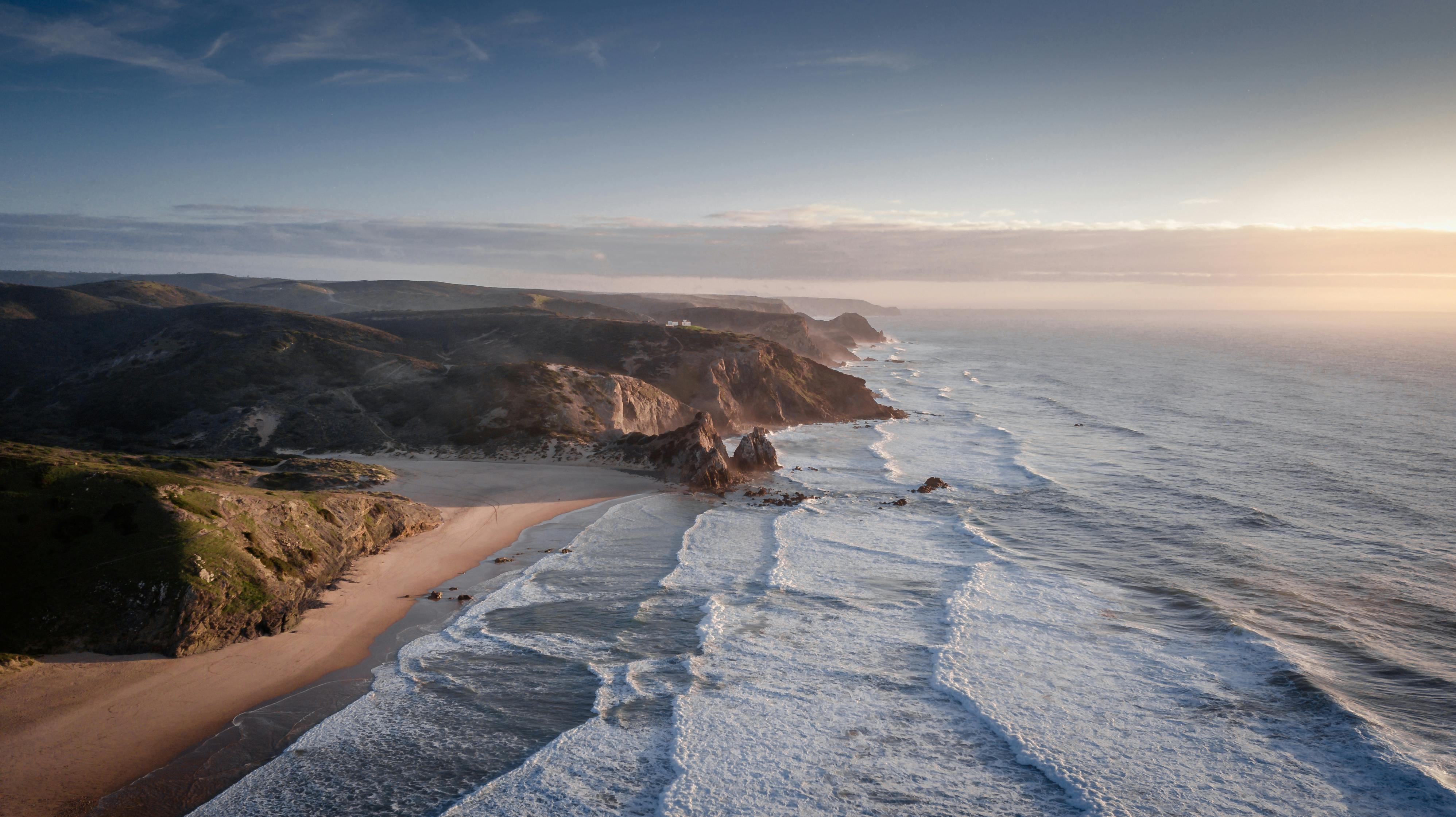 Long Waves Swamping a Sandy Beach · Free Stock Photo