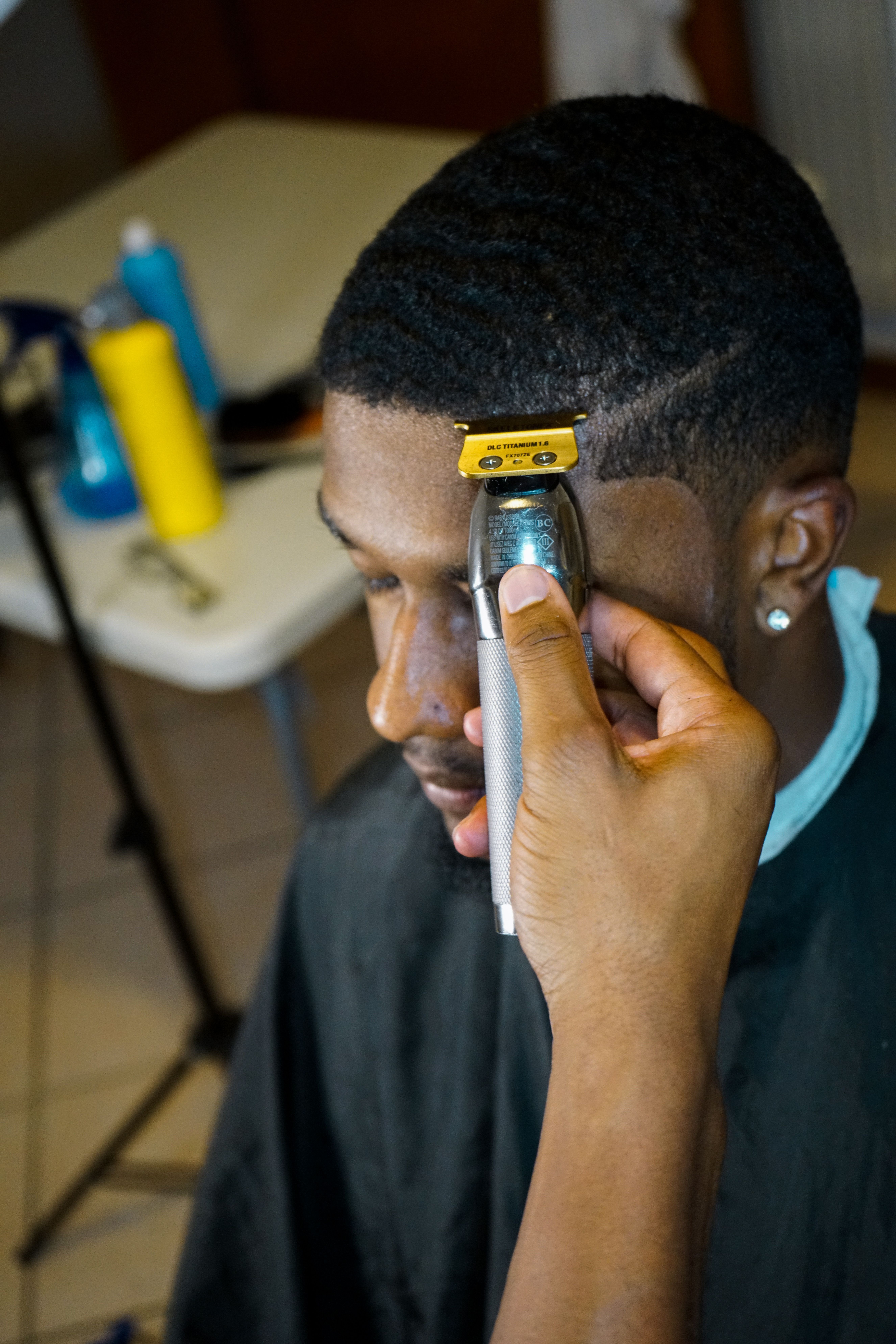 Man Getting his Hair Trimmed at the Barbers · Free Stock Photo