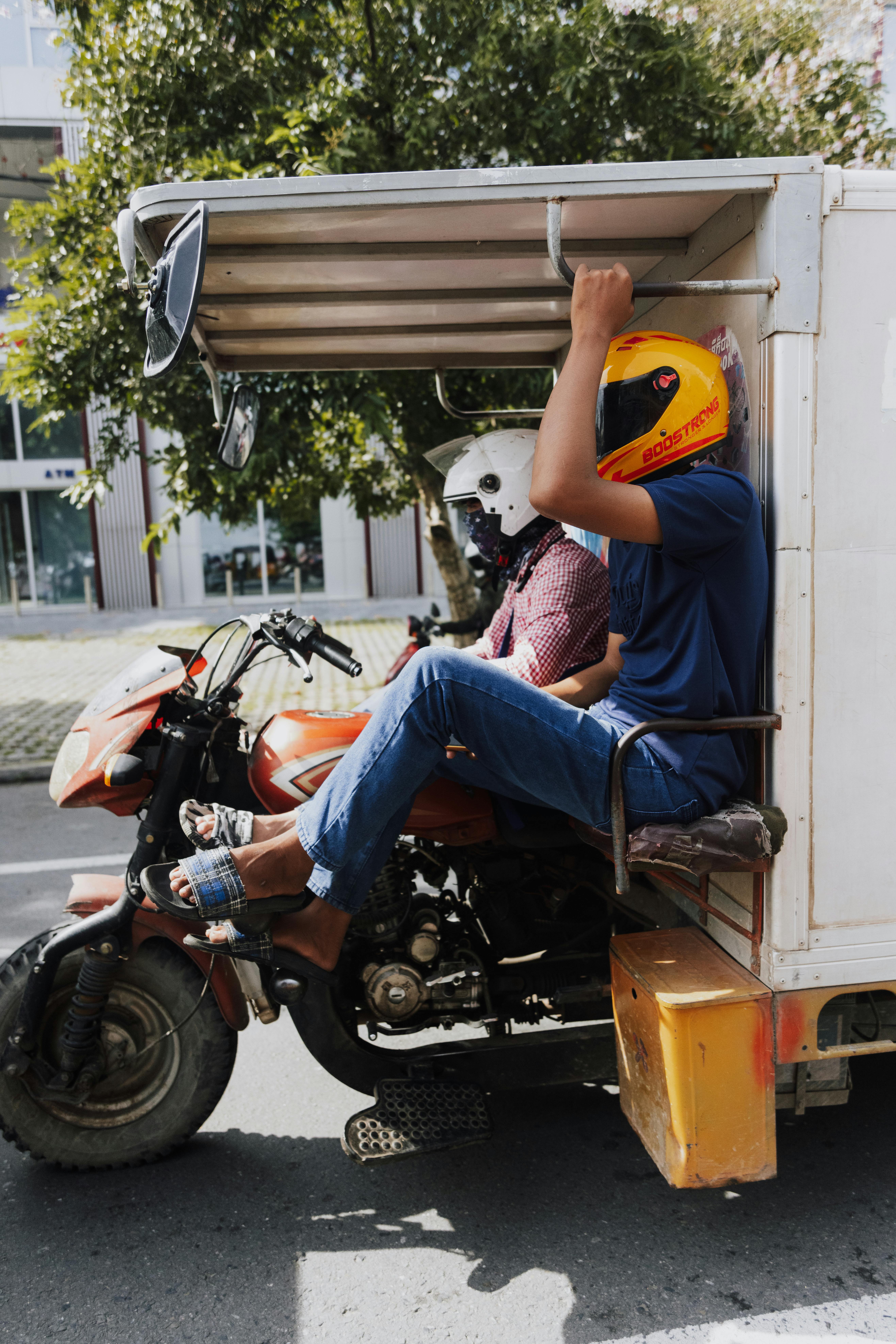 Men Riding on a Motorbike with a Trailer · Free Stock Photo