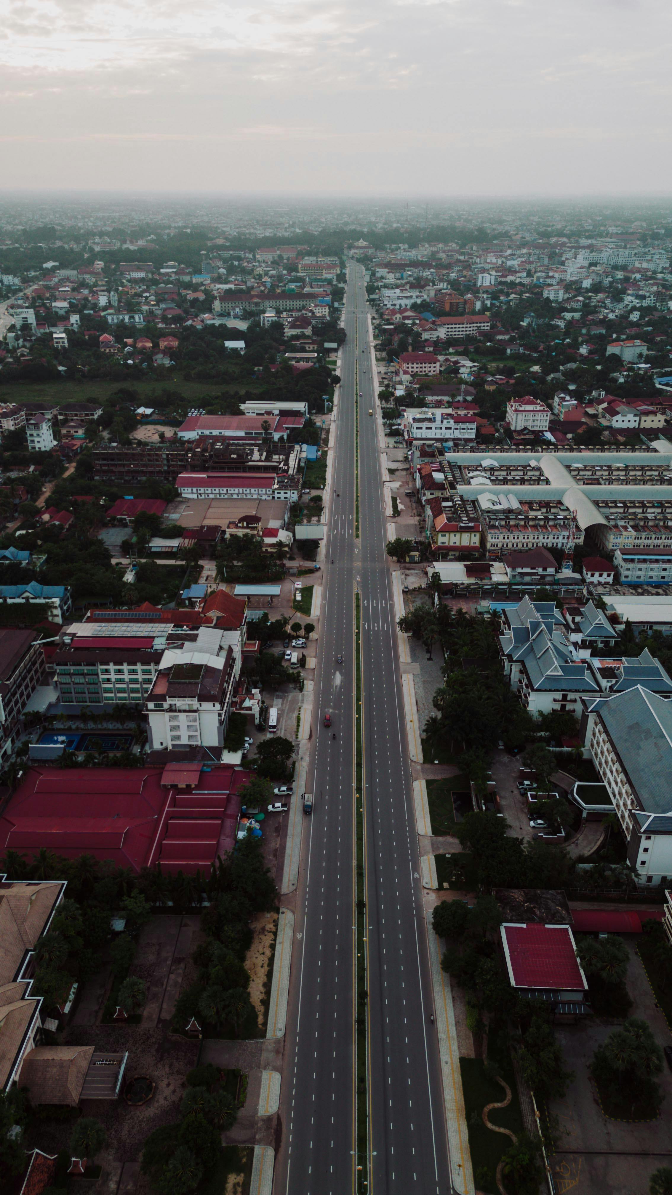 Aerial View of a Straight Section of Highway Through the City · Free ...