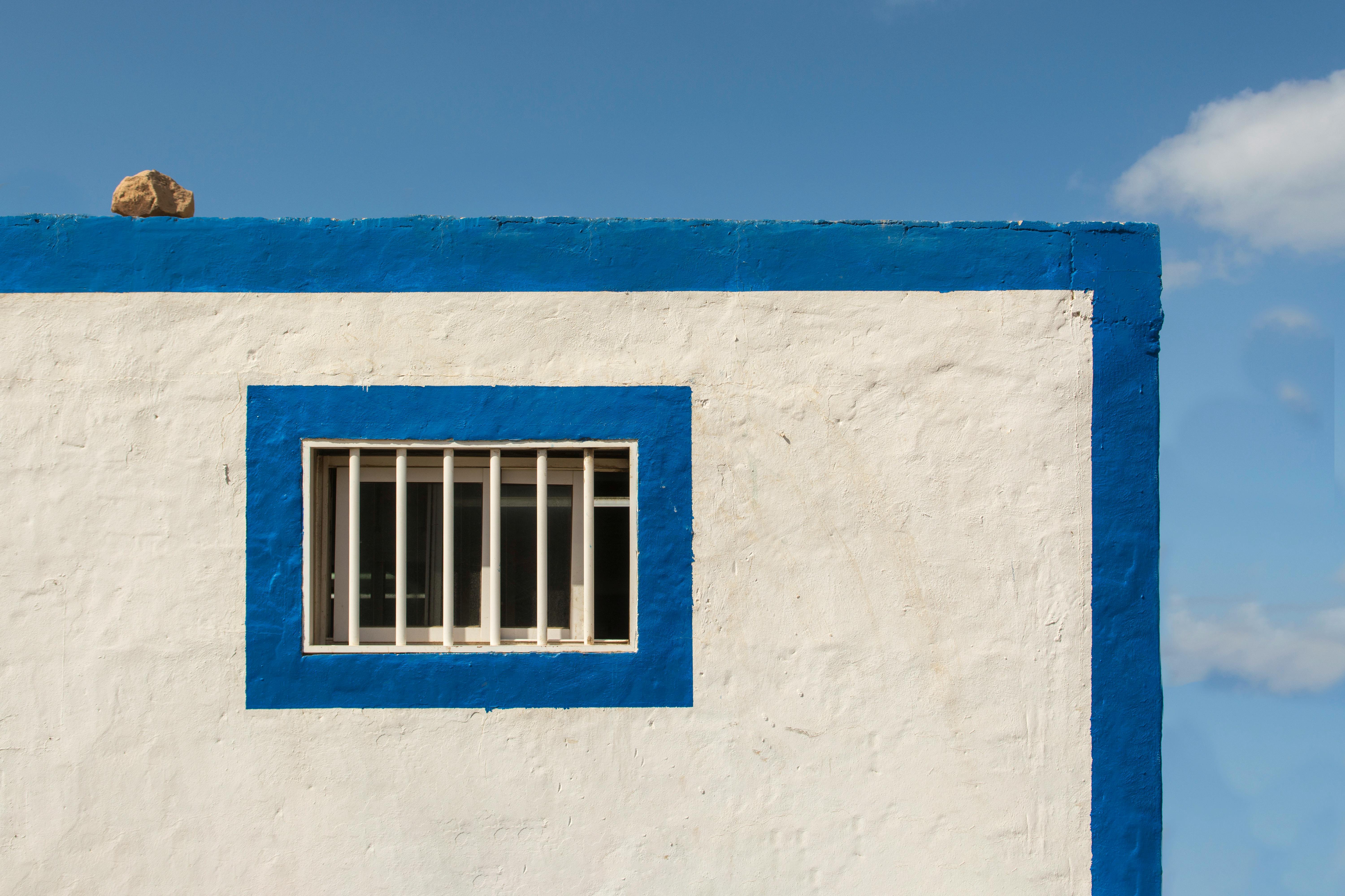Windows on White Building Wall · Free Stock Photo