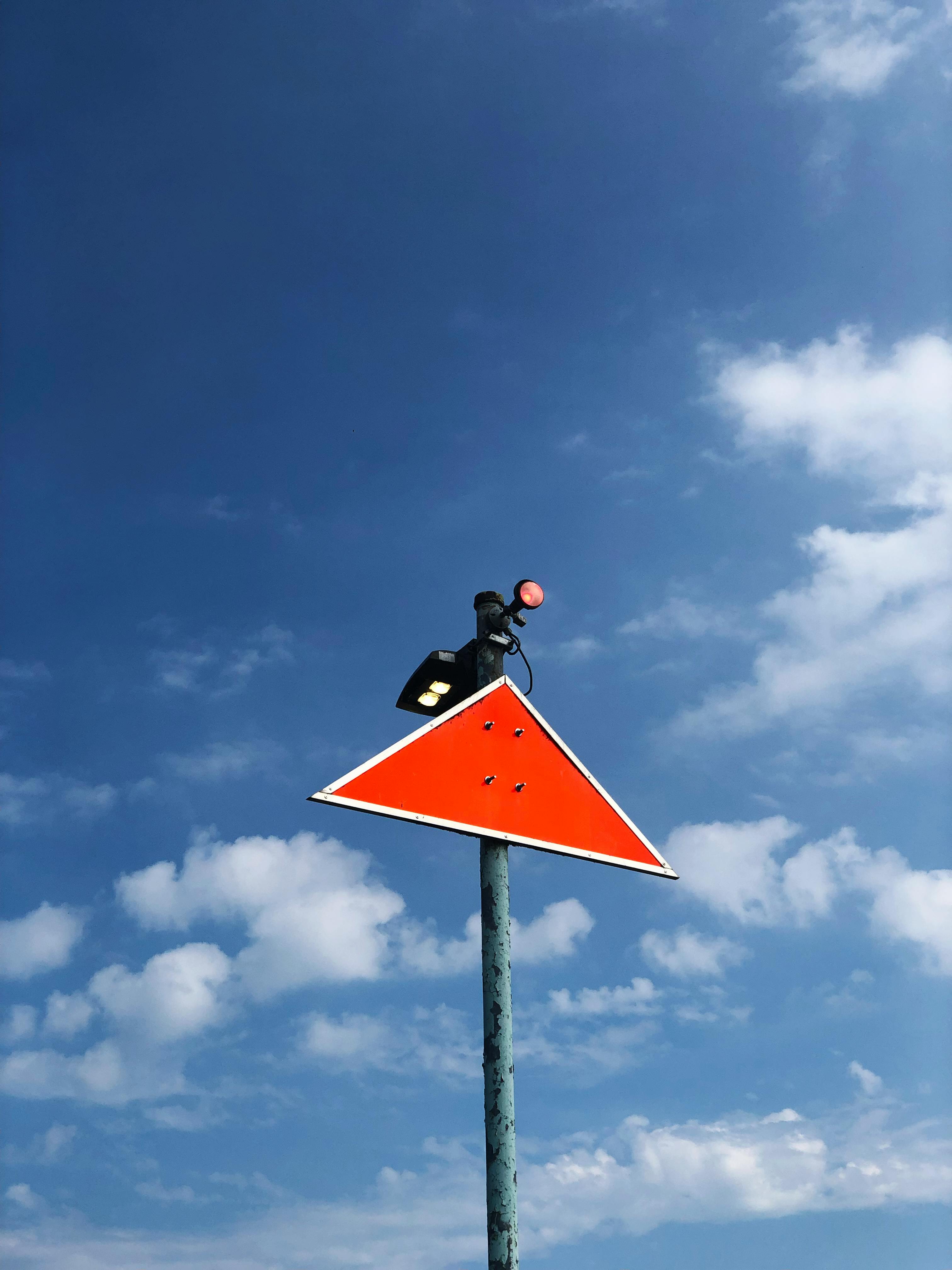 A Speed Camera on a Triangle Sign · Free Stock Photo