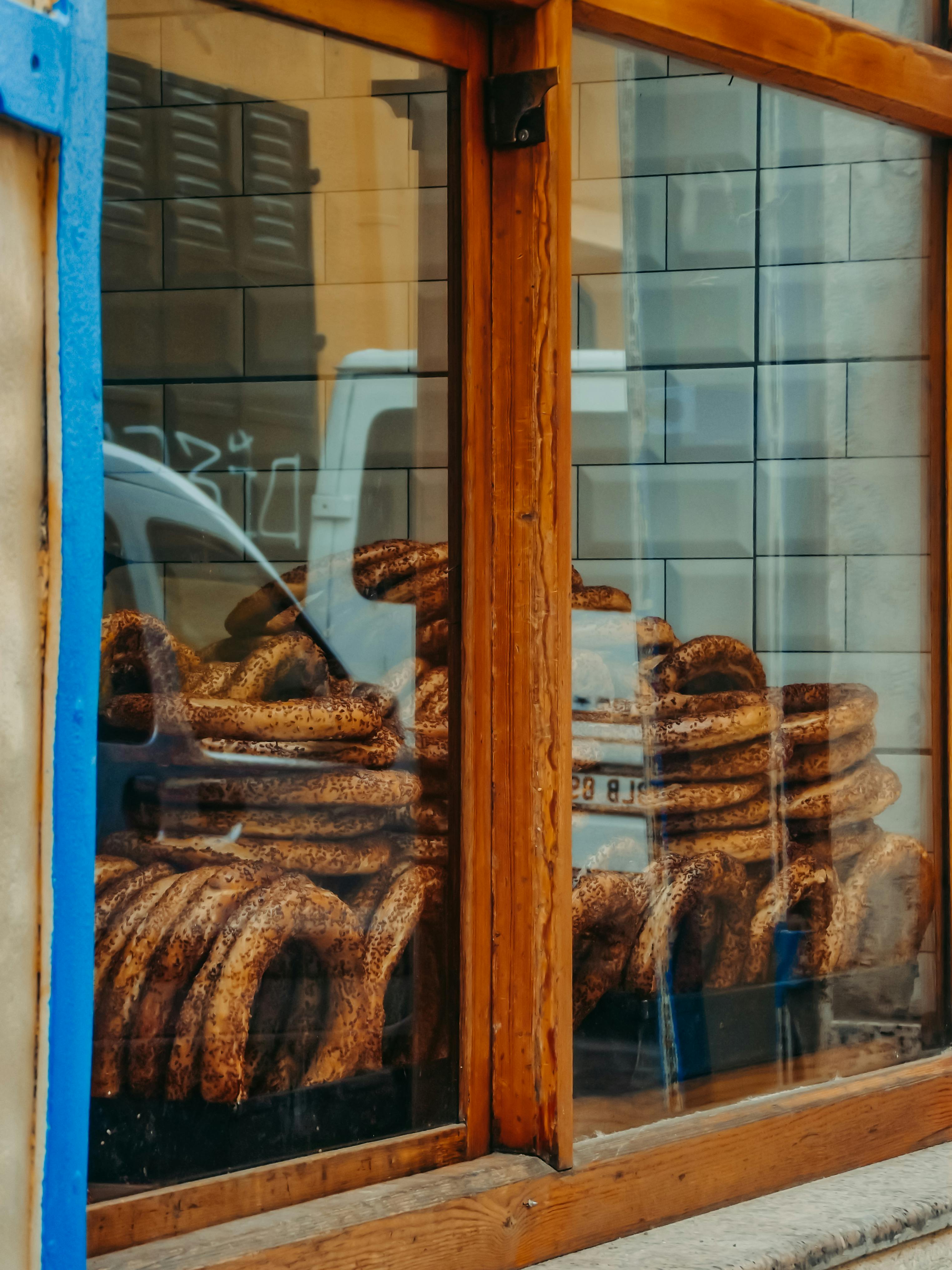 Croissants in a Bakery Seen From a Window · Free Stock Photo