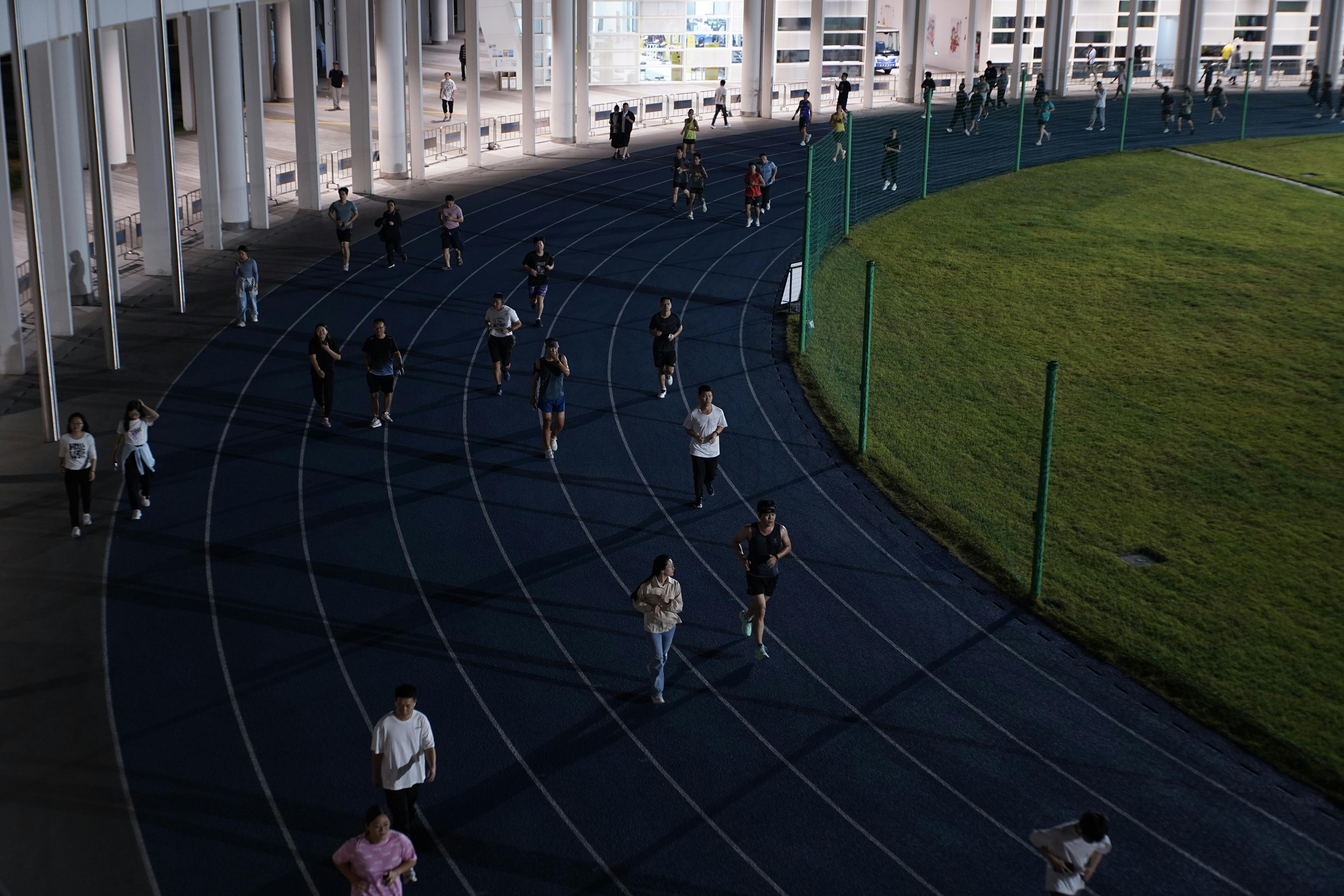 People on a Running Track · Free Stock Photo