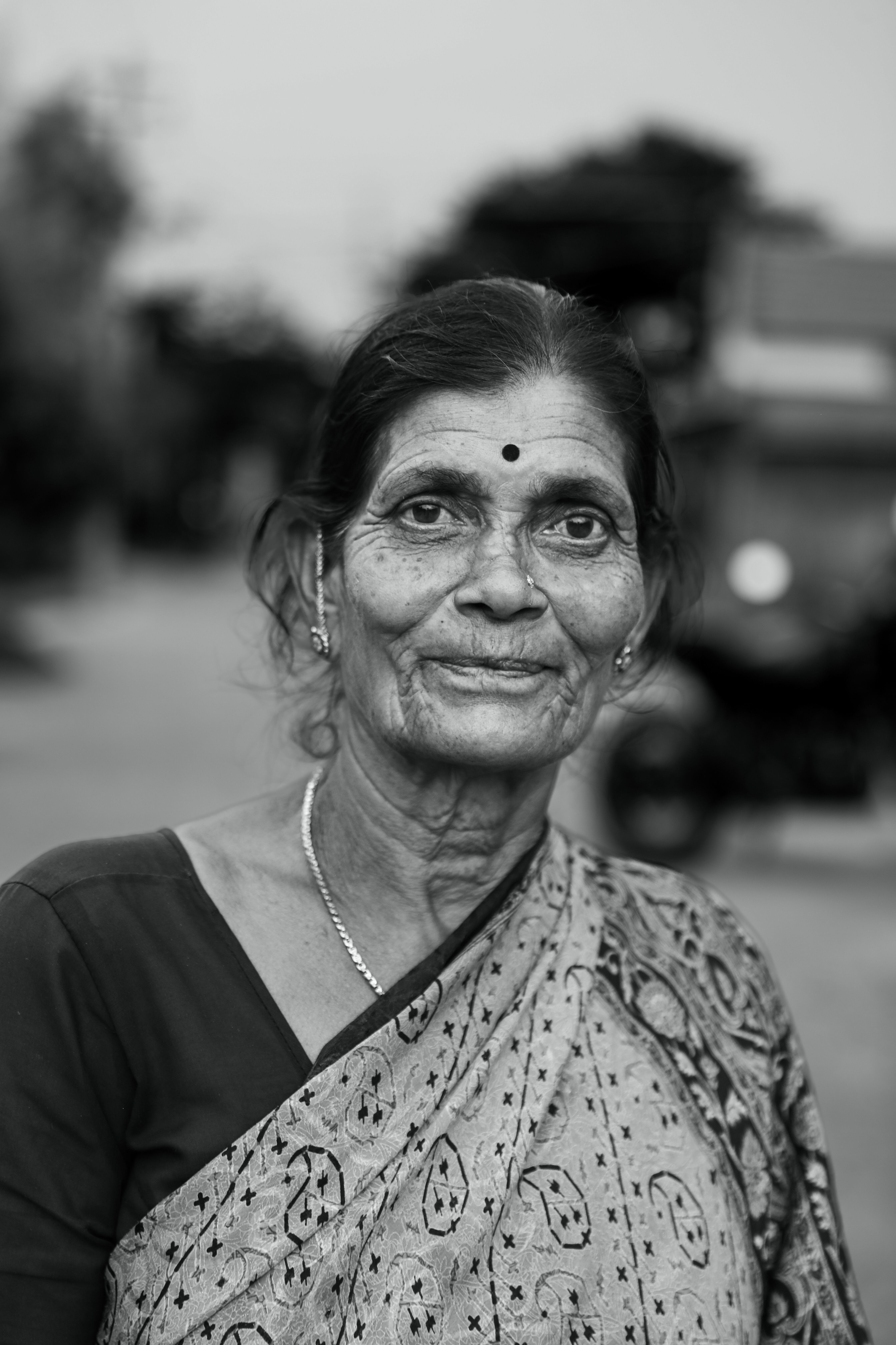 Elderly Woman in Traditional Clothing · Free Stock Photo