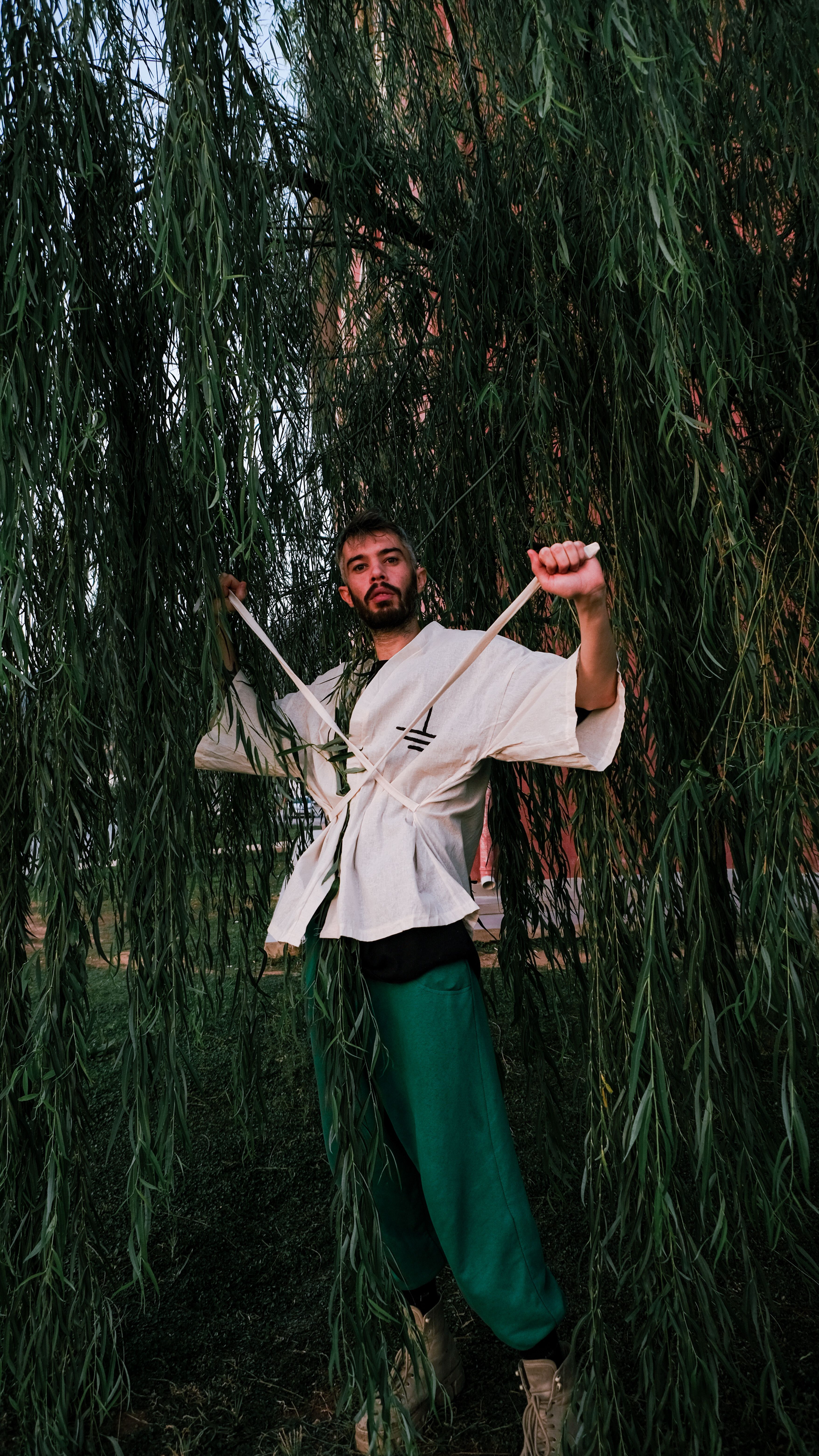 Man Wearing a Martial Arts Outfit, Standing under a Willow Tree · Free ...