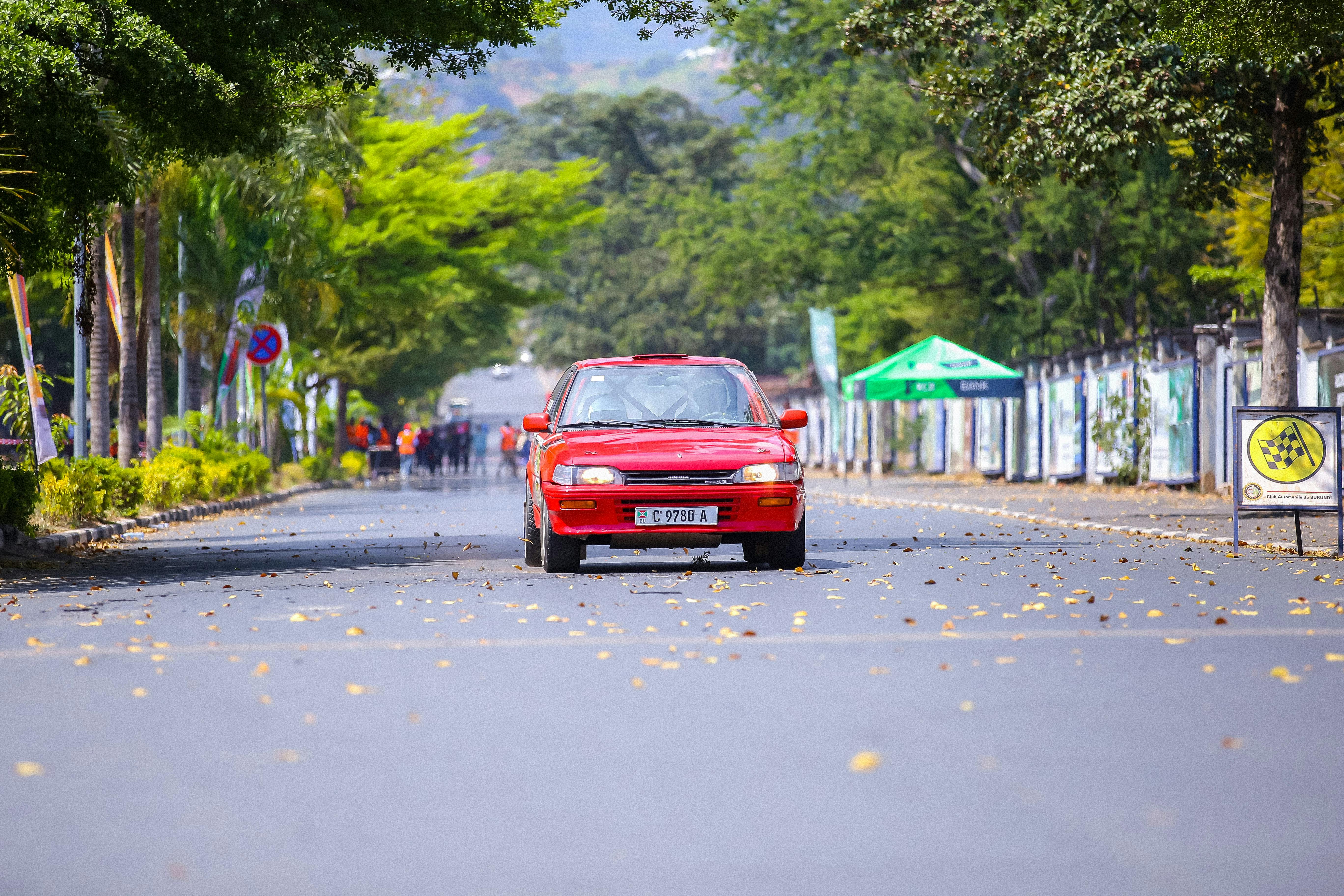 Red Sports Car Racing on the Road · Free Stock Photo