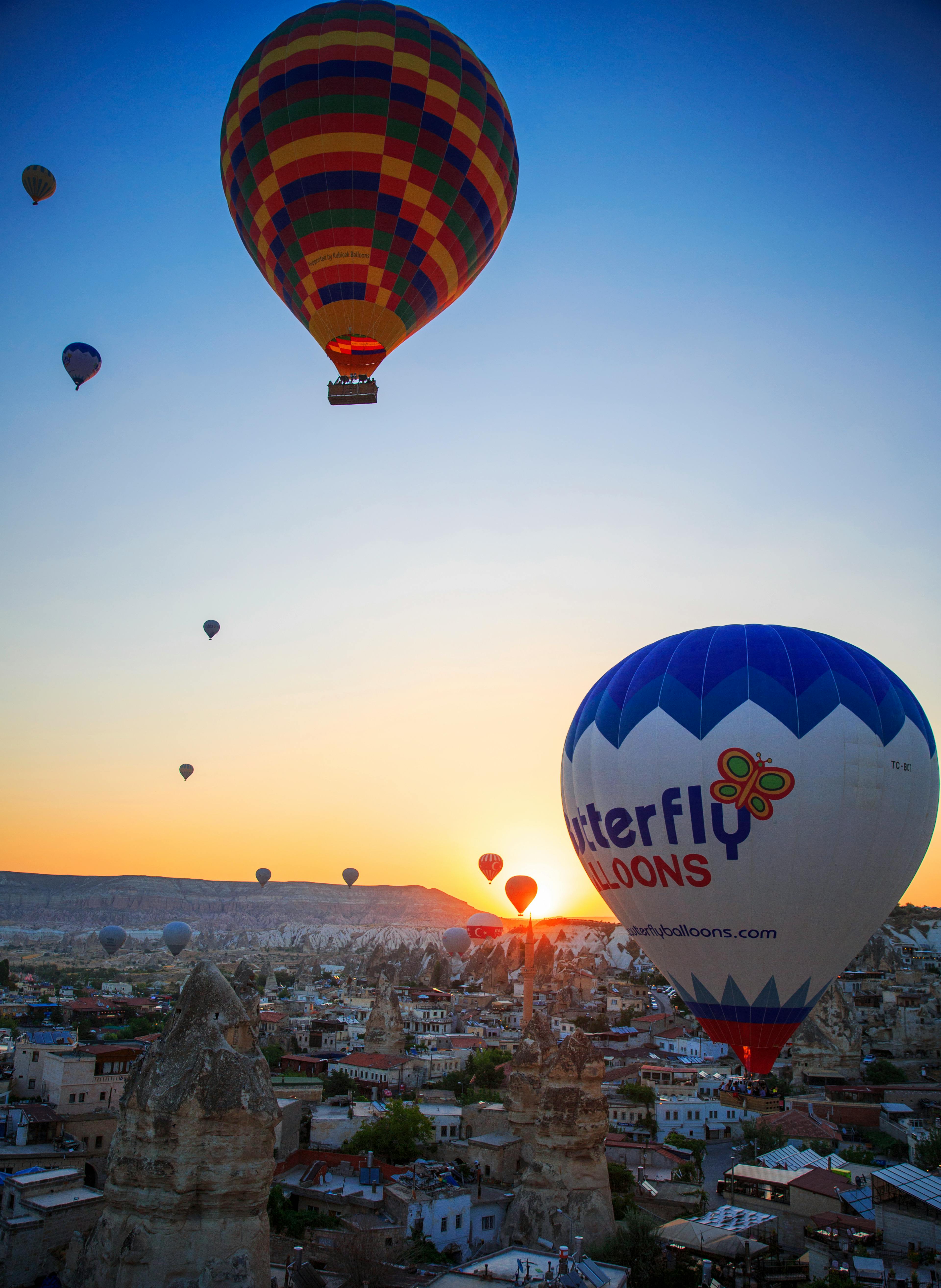 Hot Air Balloons Flying Above the Valley · Free Stock Photo