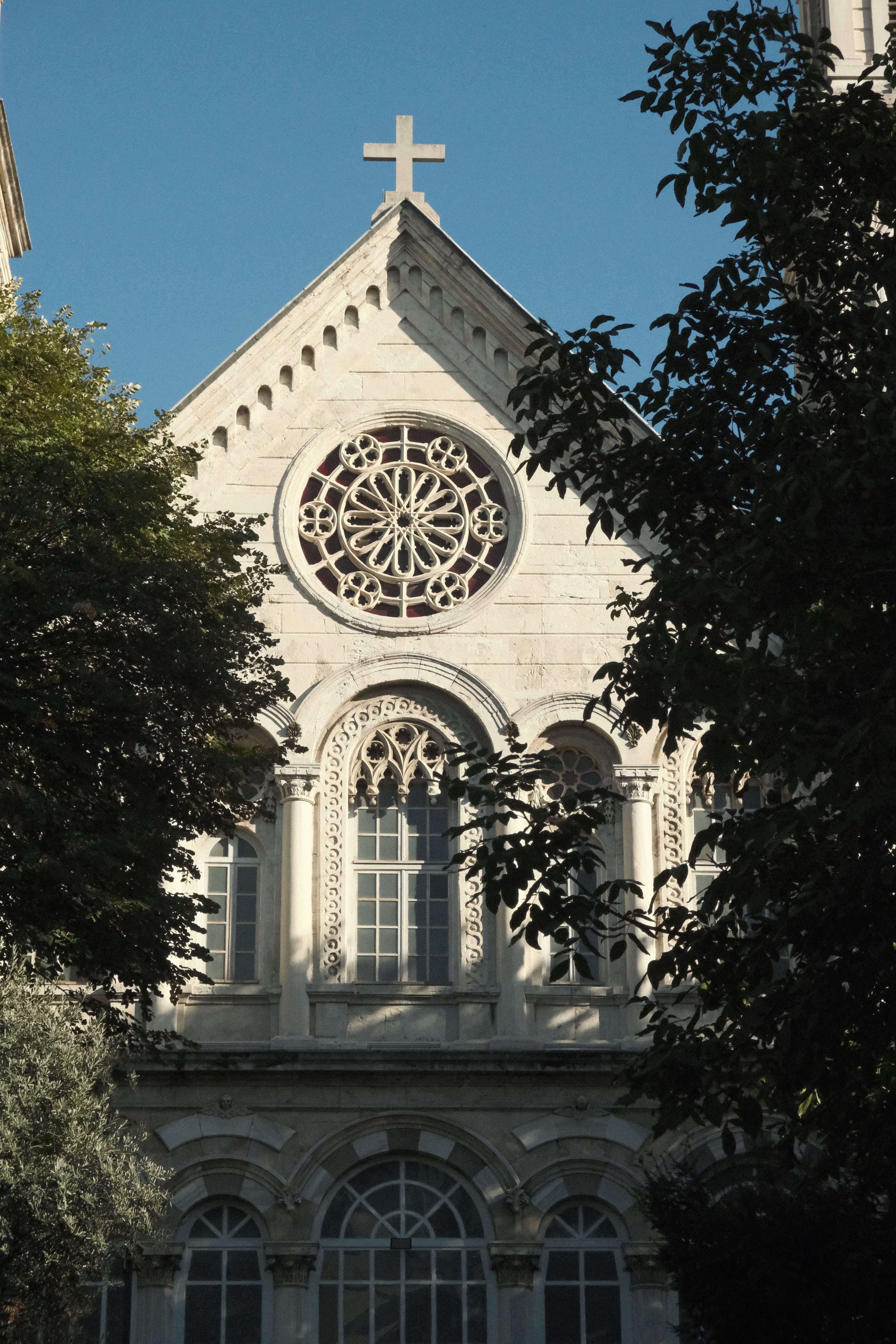 Facade of Hagia Triada Greek Orthodox Church behind Trees · Free Stock ...