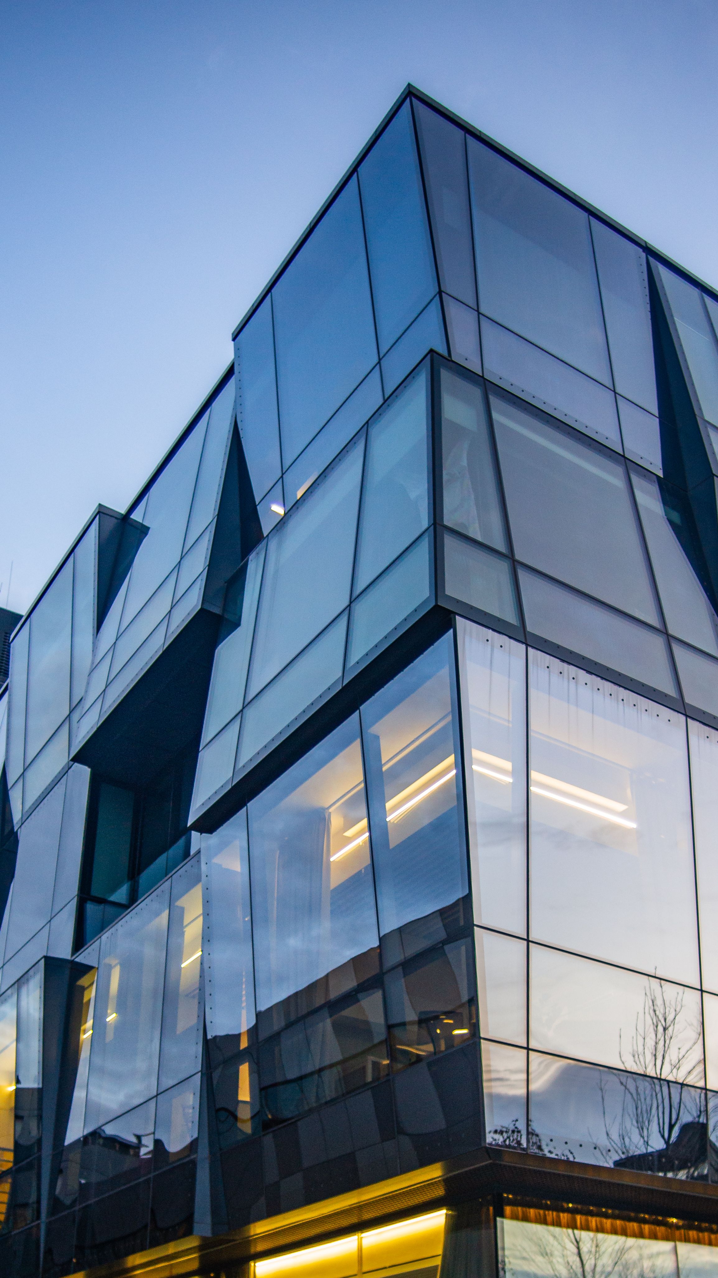 Facade of a Modern Glass Building in City · Free Stock Photo