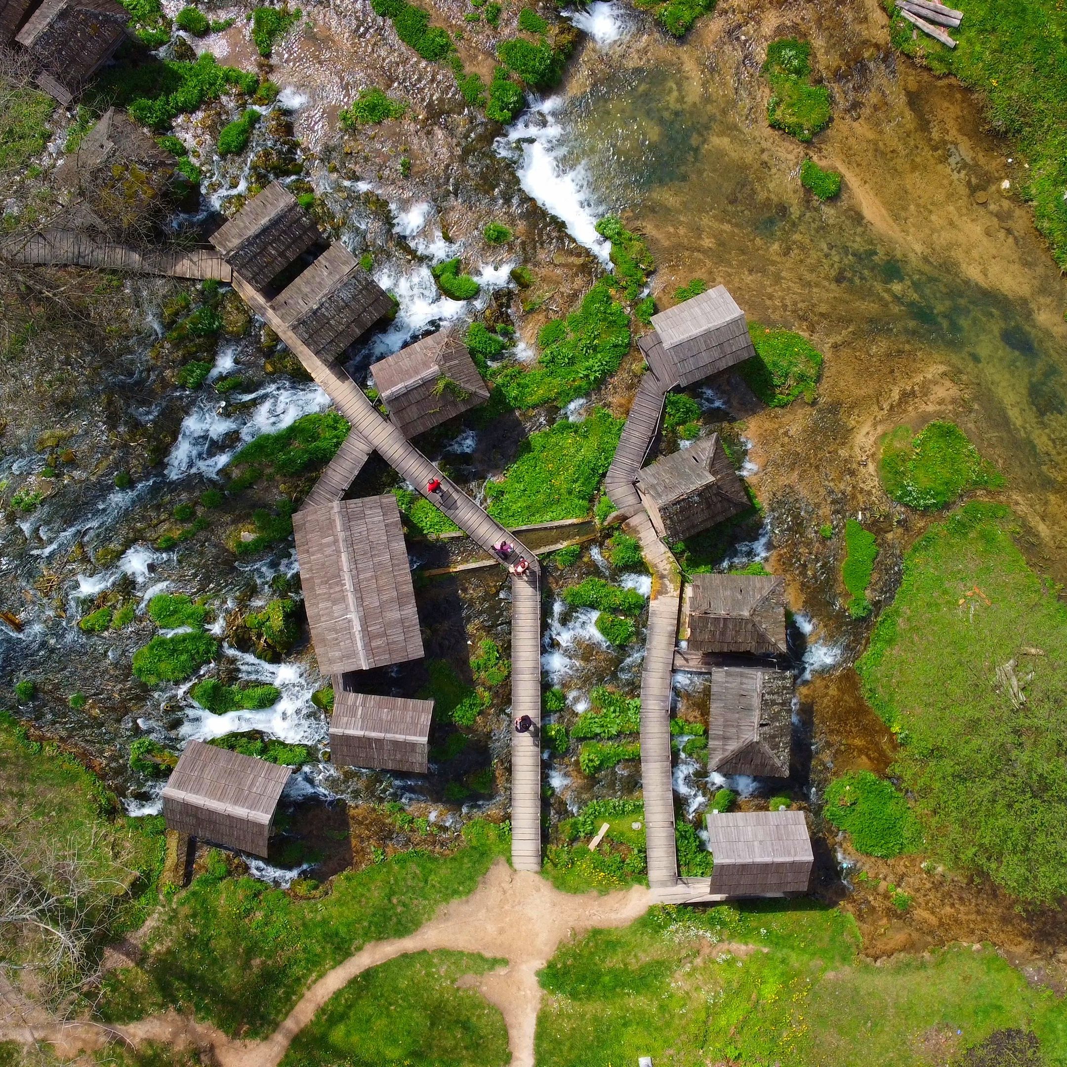 Wooden Huts in a Valley · Free Stock Photo