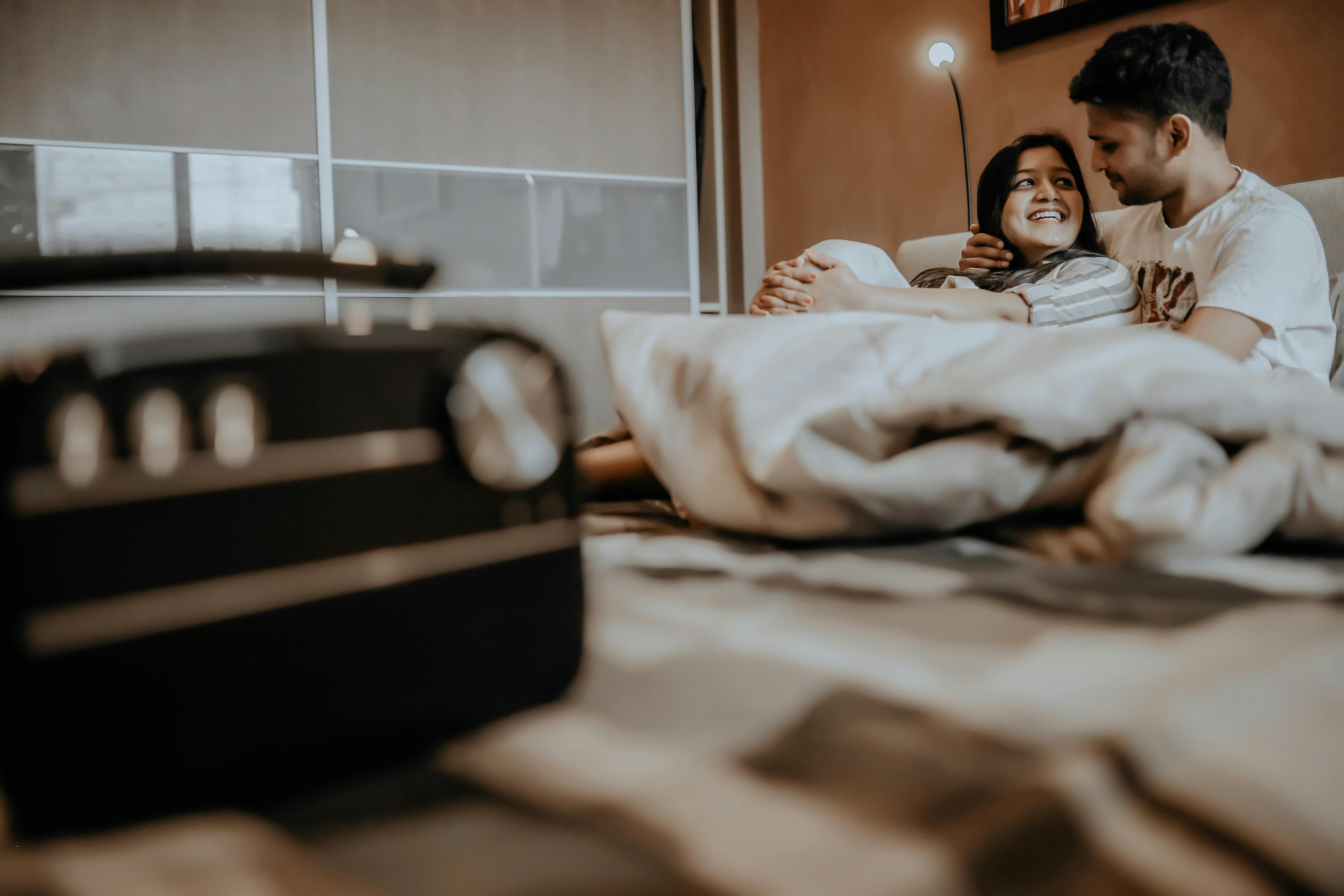 Woman Sitting on Mans Shoulder · Free Stock Photo