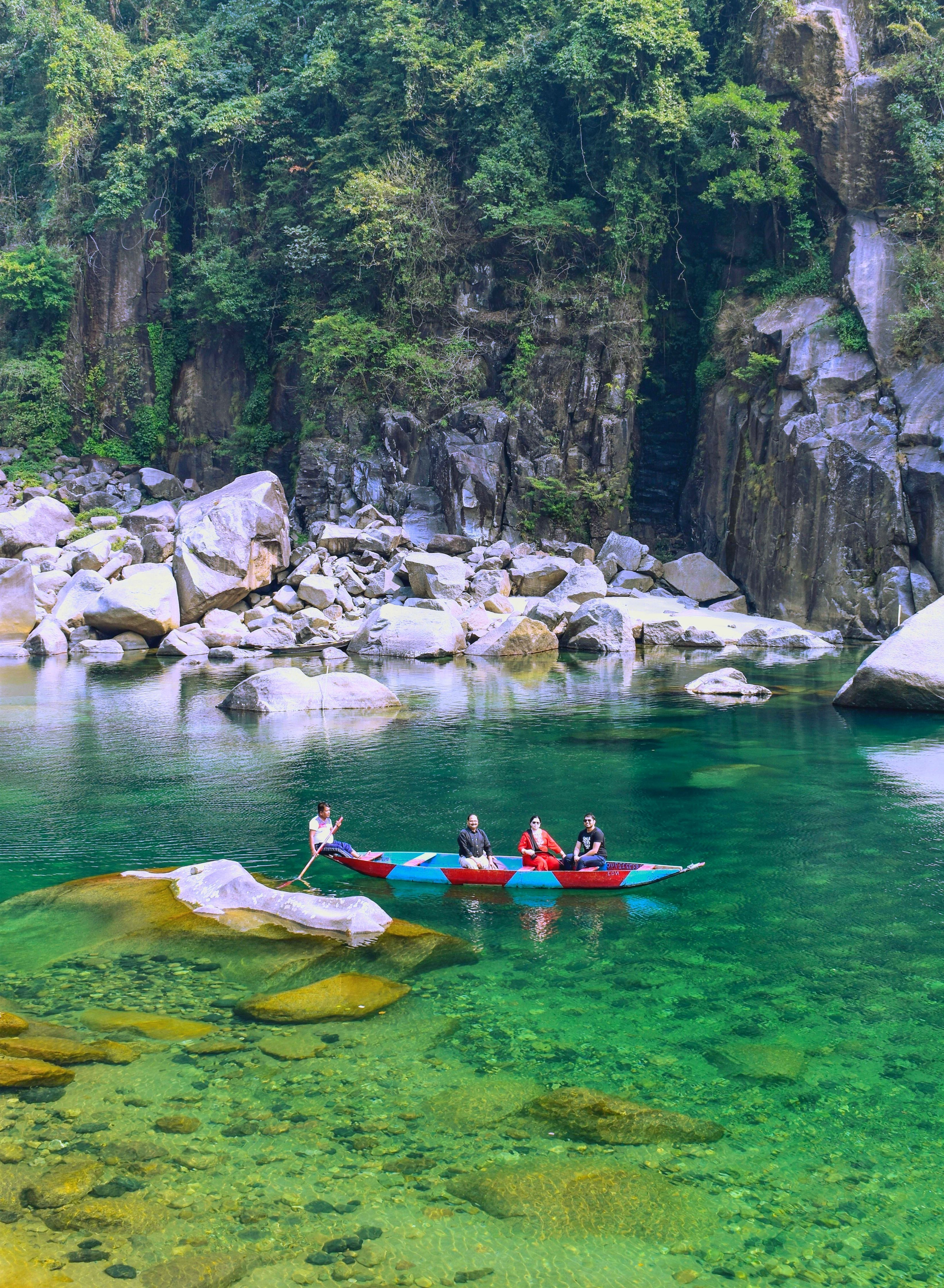 People in Canoe on River · Free Stock Photo