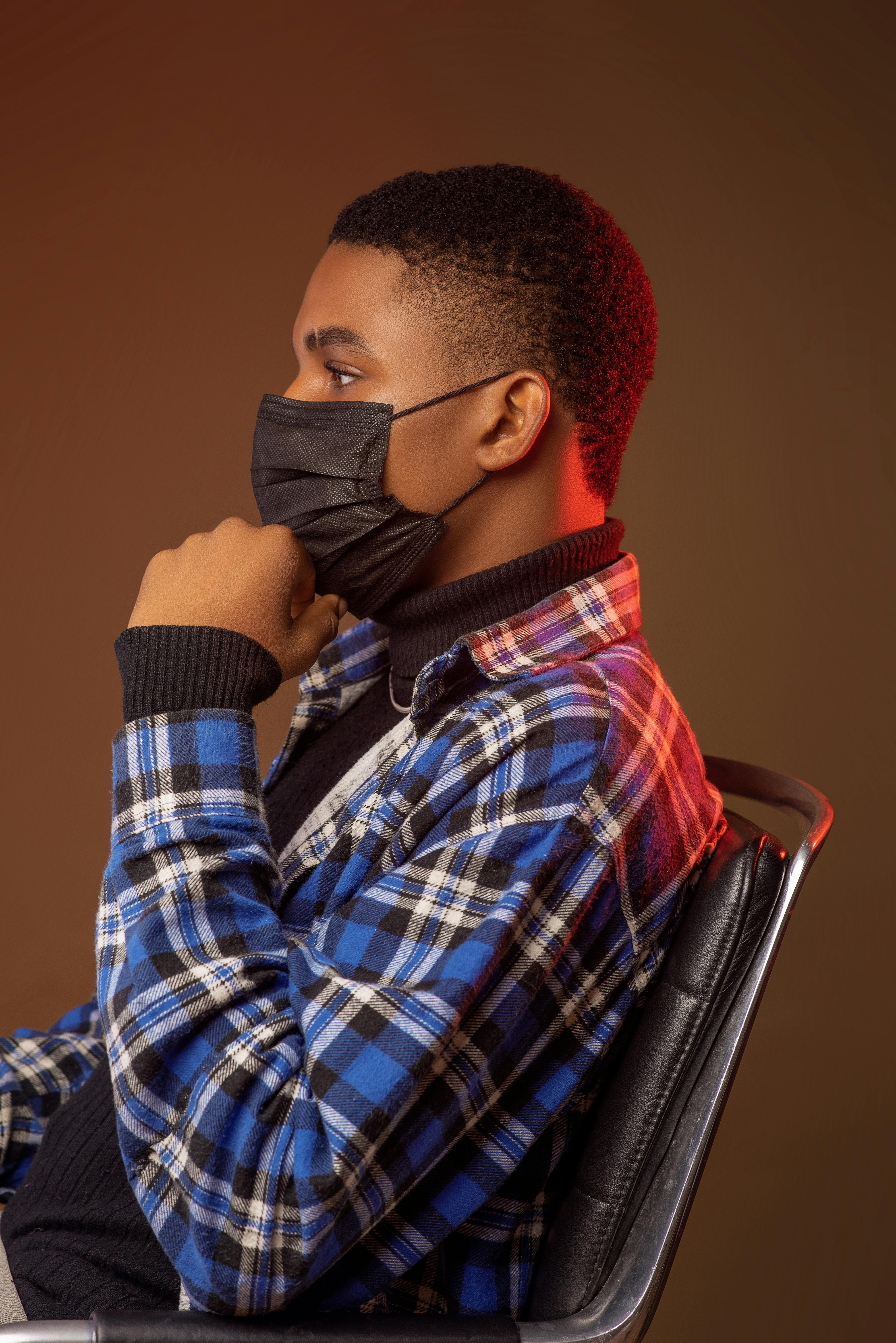 Man in Check Shirt and Black Face Mask · Free Stock Photo