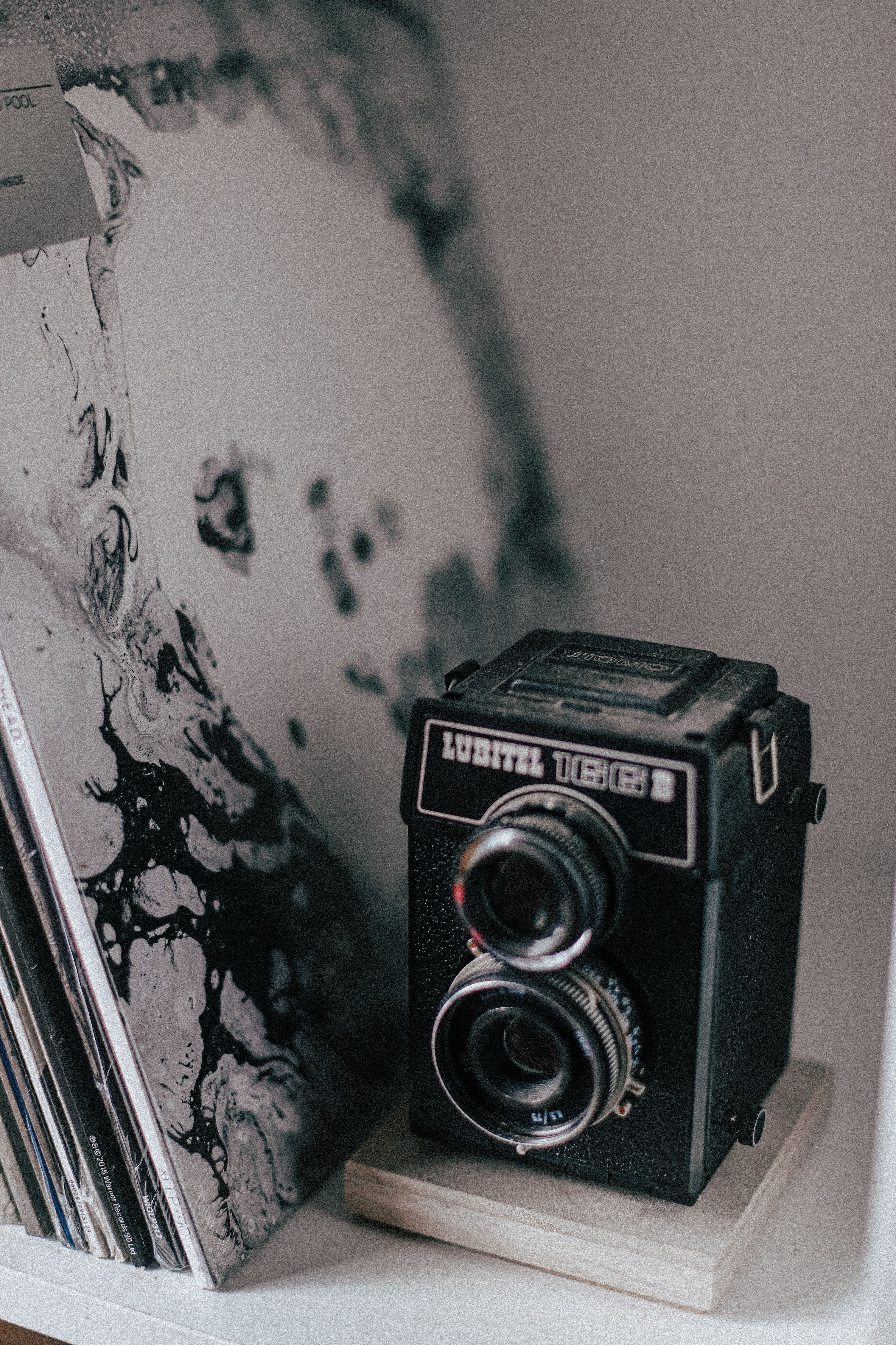 Old-Fashioned Camera and Vinyl Sleeves · Free Stock Photo