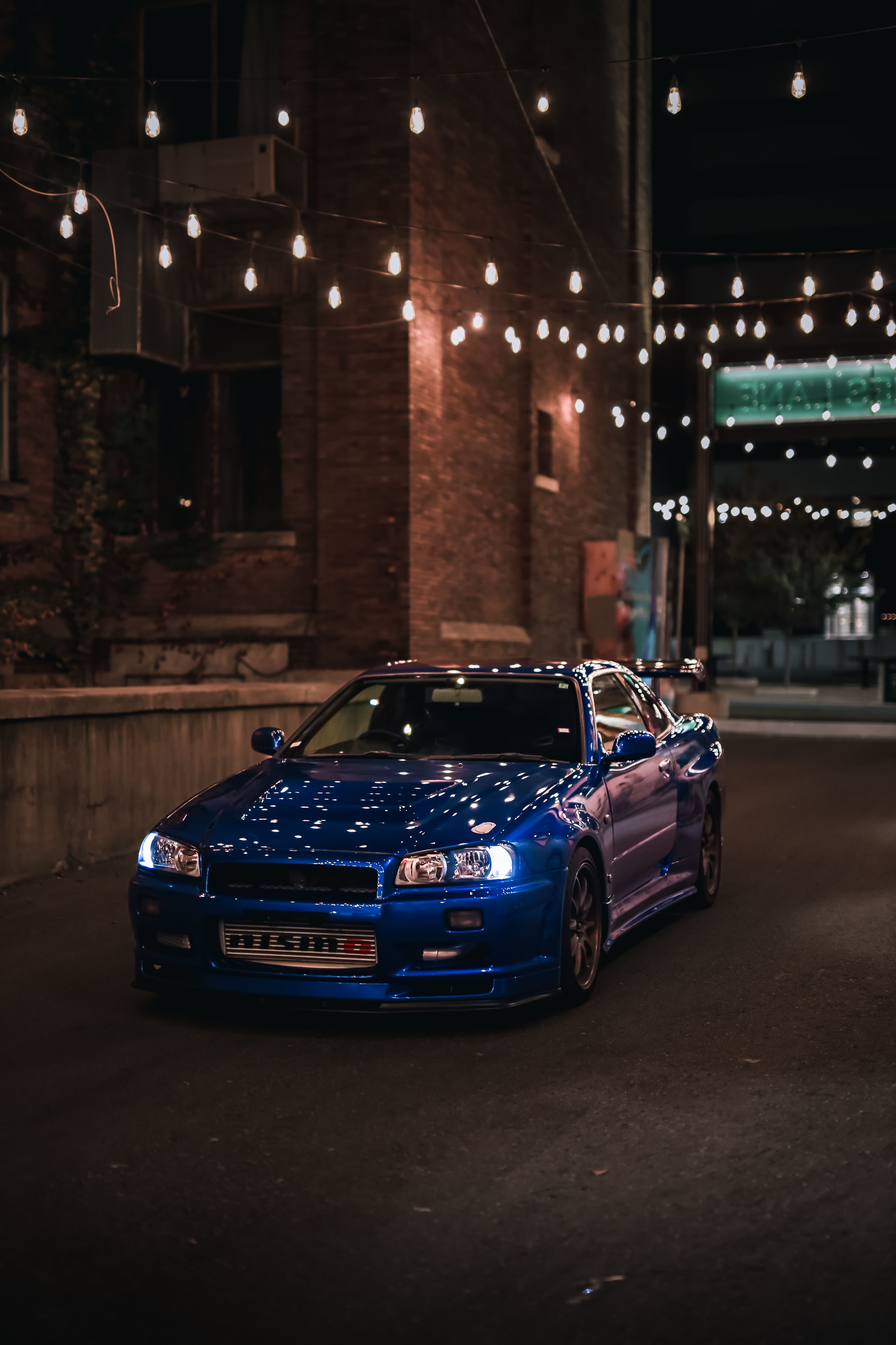 Nissan Skyline GT-R on a Parking Lot at Night · Free Stock Photo