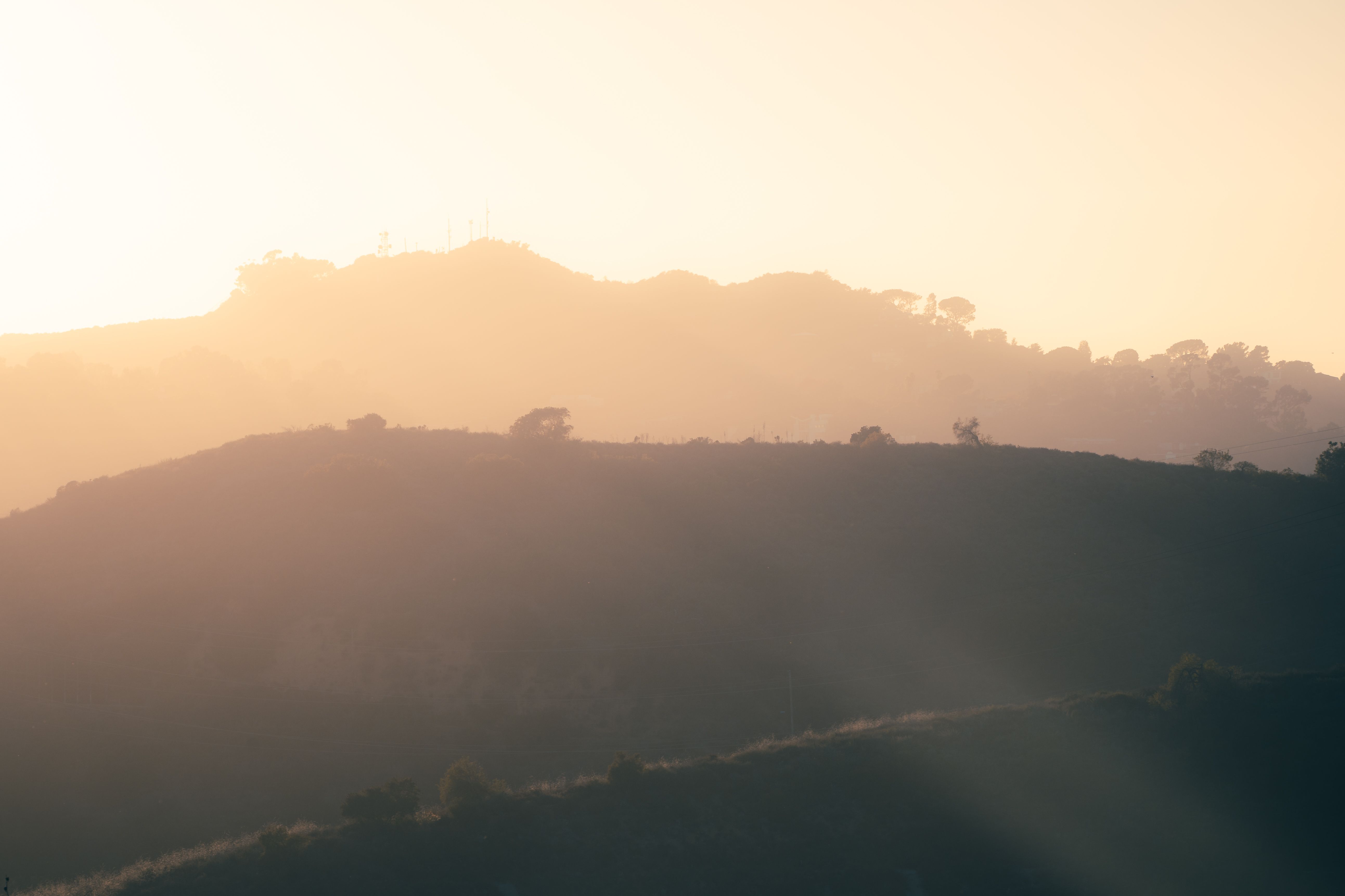 Sunset Sunlight over Hill in Countryside · Free Stock Photo