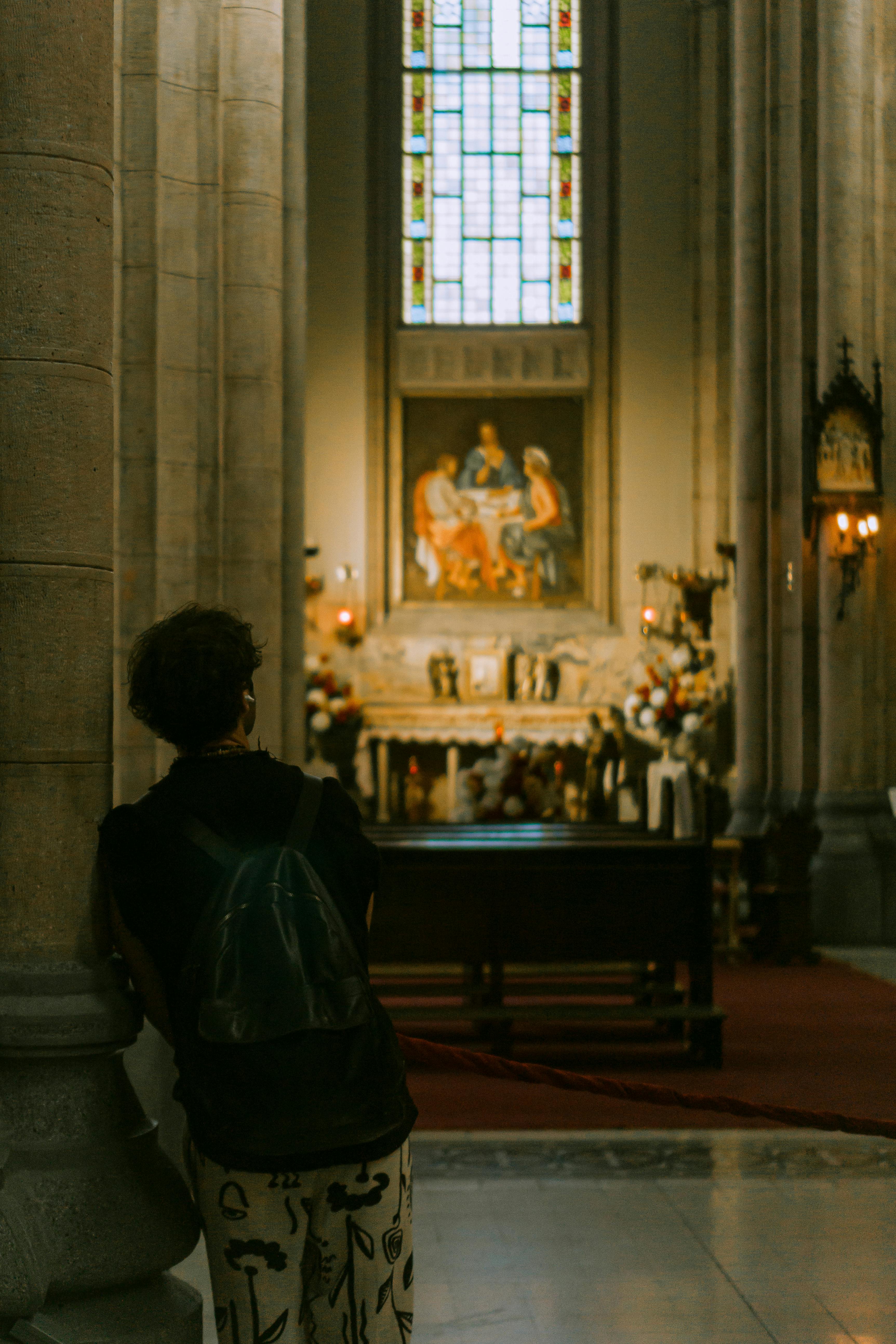 Back of a Man Standing in a Church · Free Stock Photo